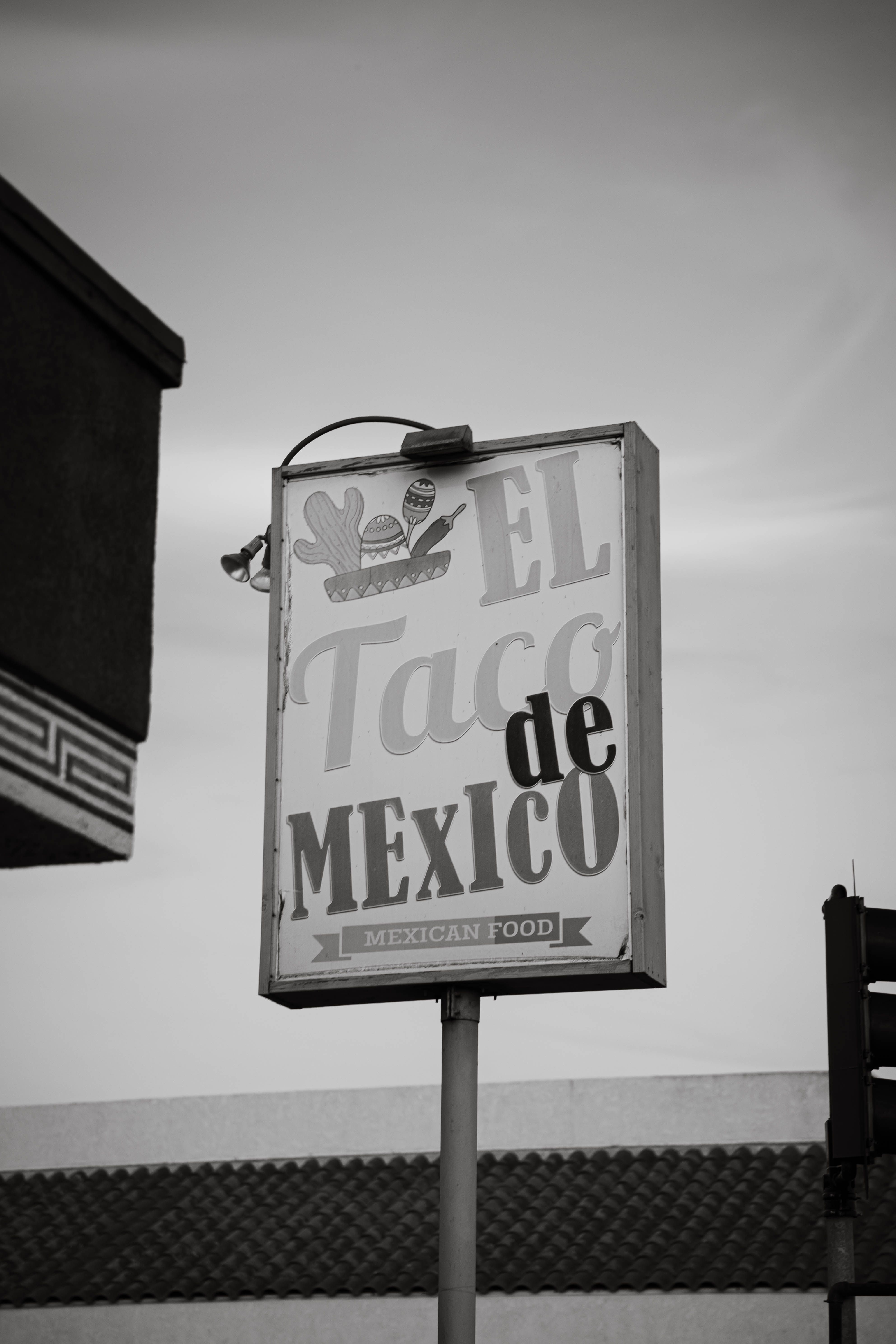 Vintage Taco Sign in Urban Street Scene · Free Stock Photo