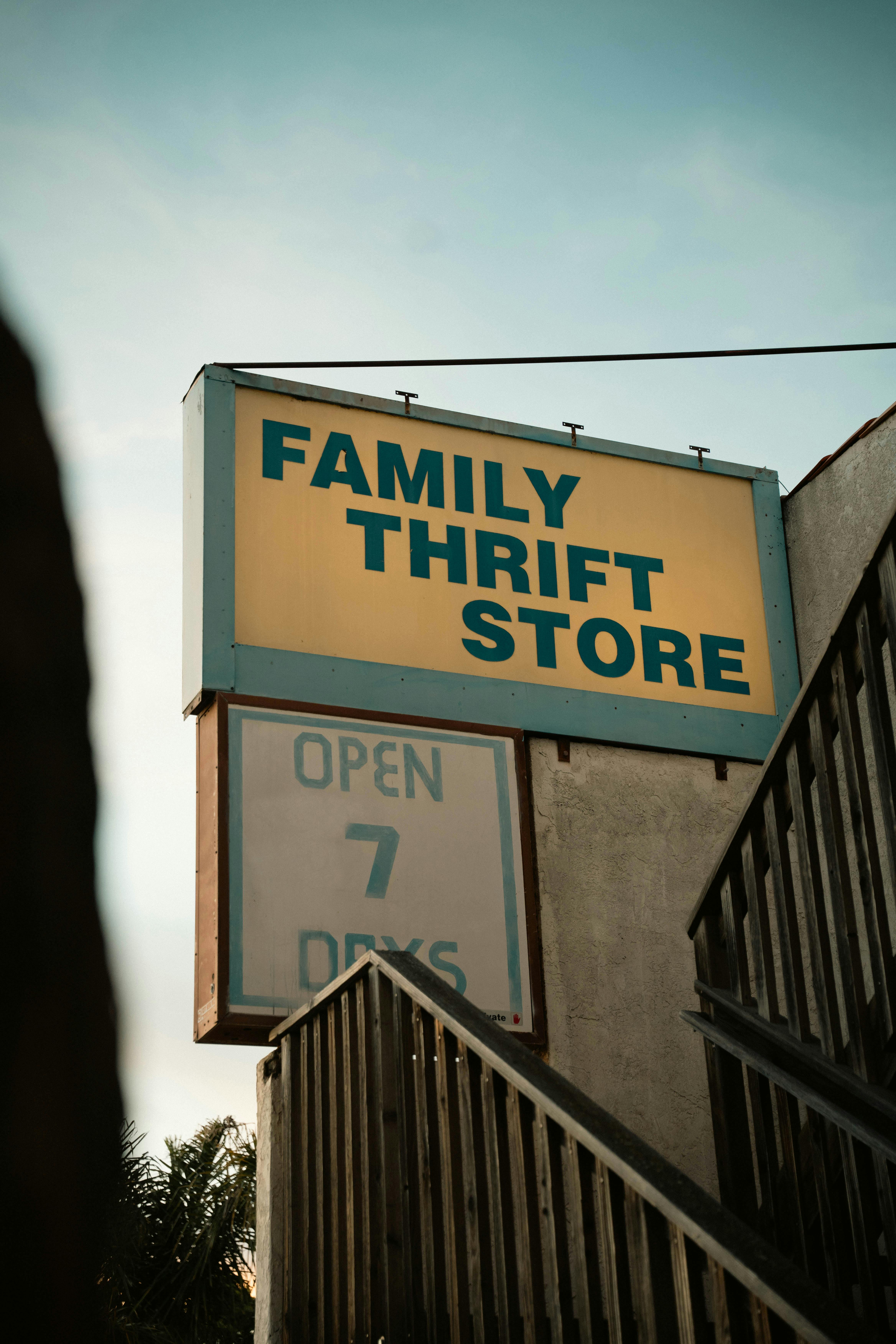 Vintage Family Thrift Store Sign with Stairs · Free Stock Photo