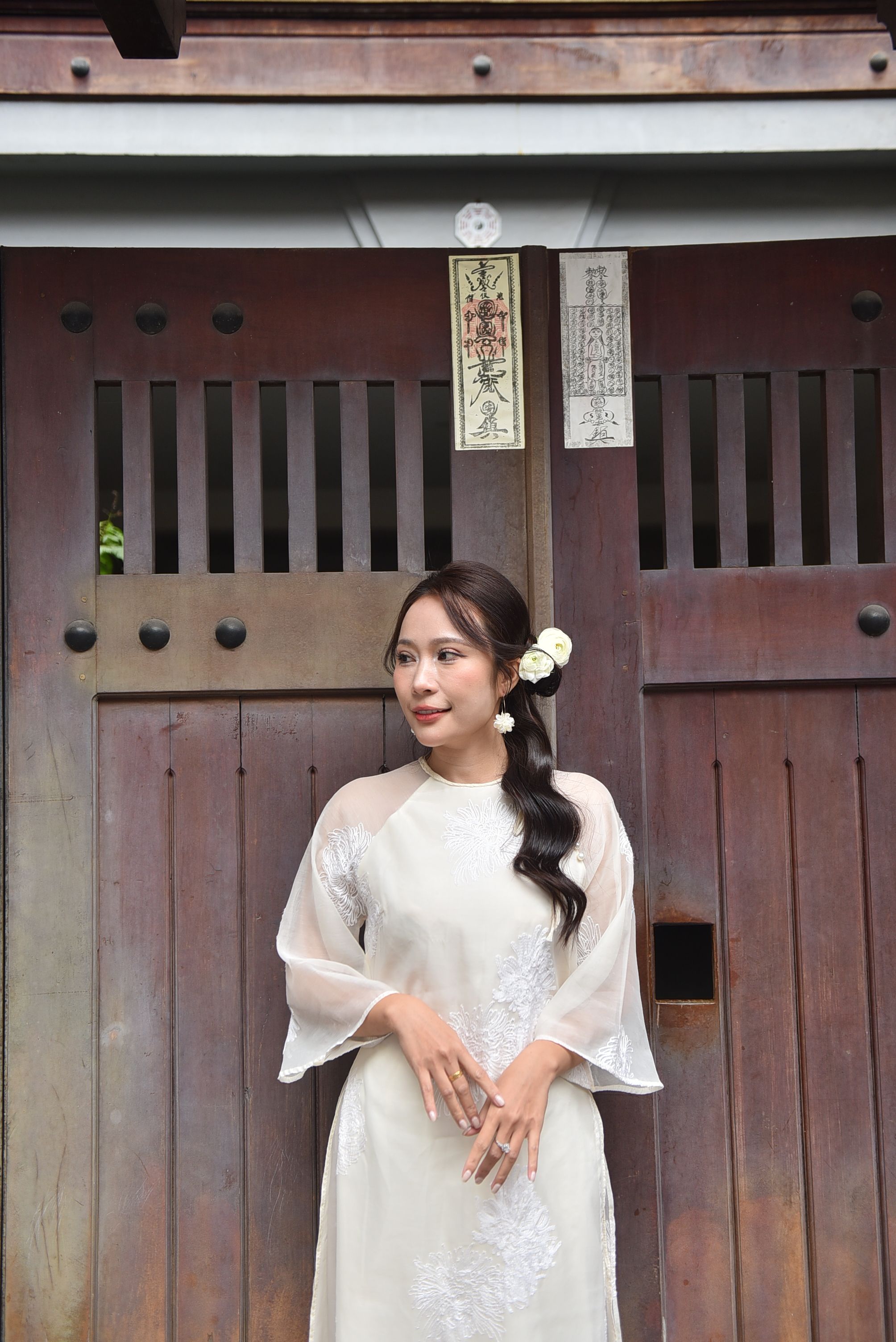 Traditional Asian Dress Woman in Front of Wooden Gate · Free Stock Photo