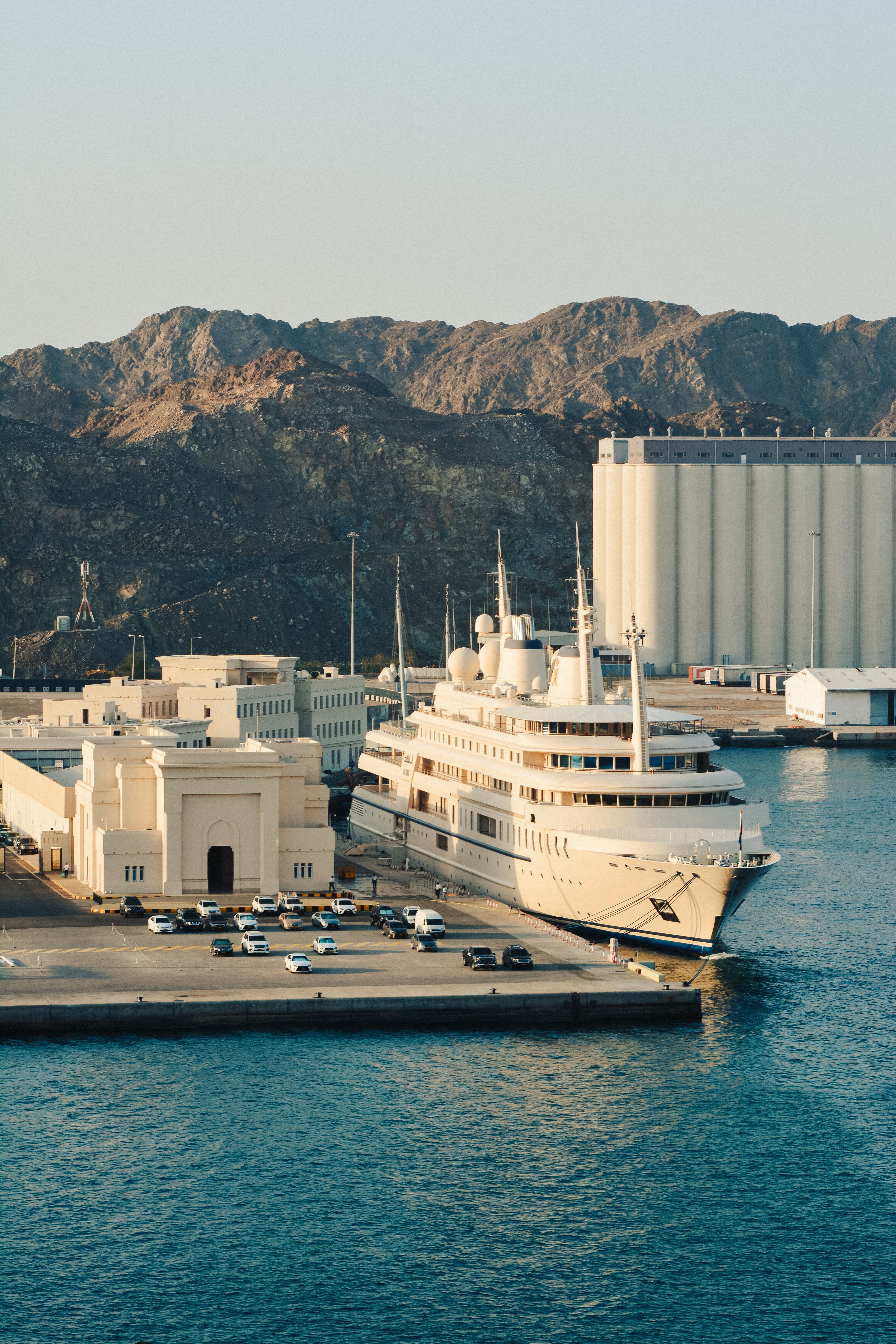 Luxury Yacht Docked at Port in Oman · Free Stock Photo