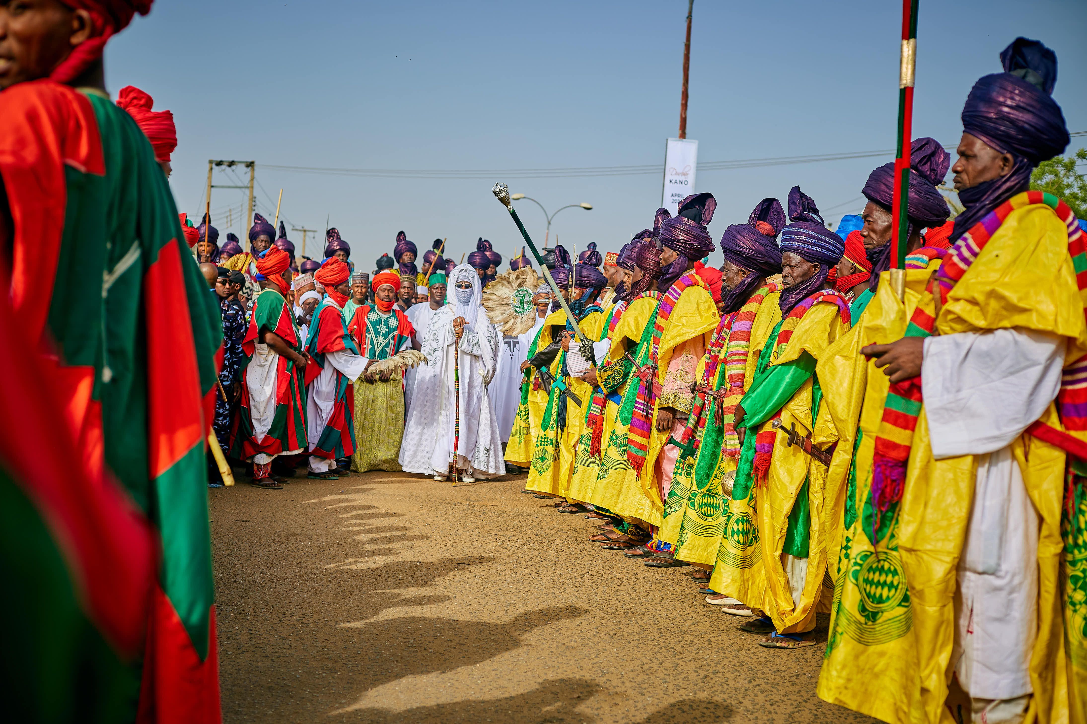 Colorful traditional parade with festive attire · Free Stock Photo