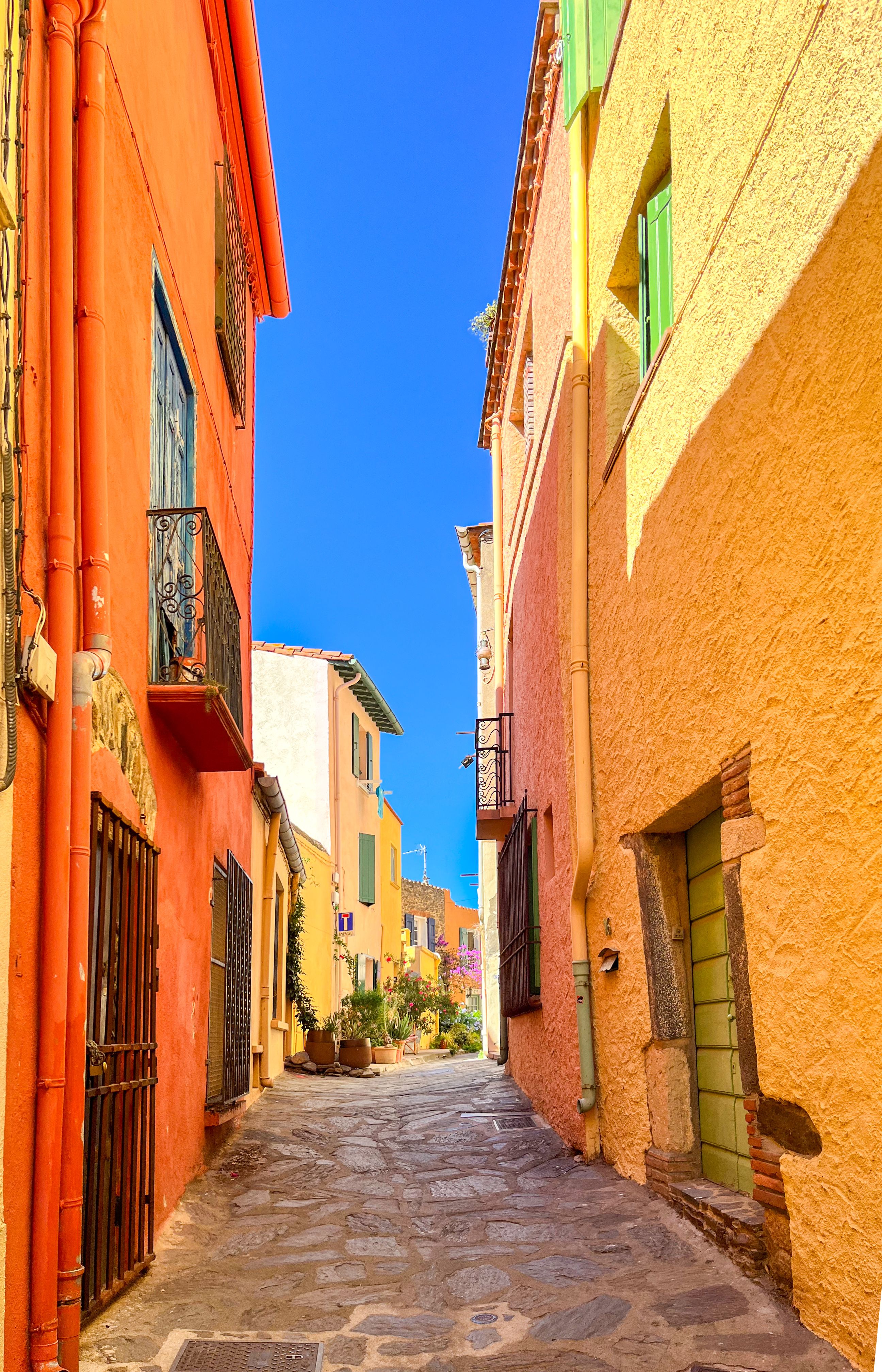 Colorful Mediterranean Alley with Vibrant Buildings · Free Stock Photo