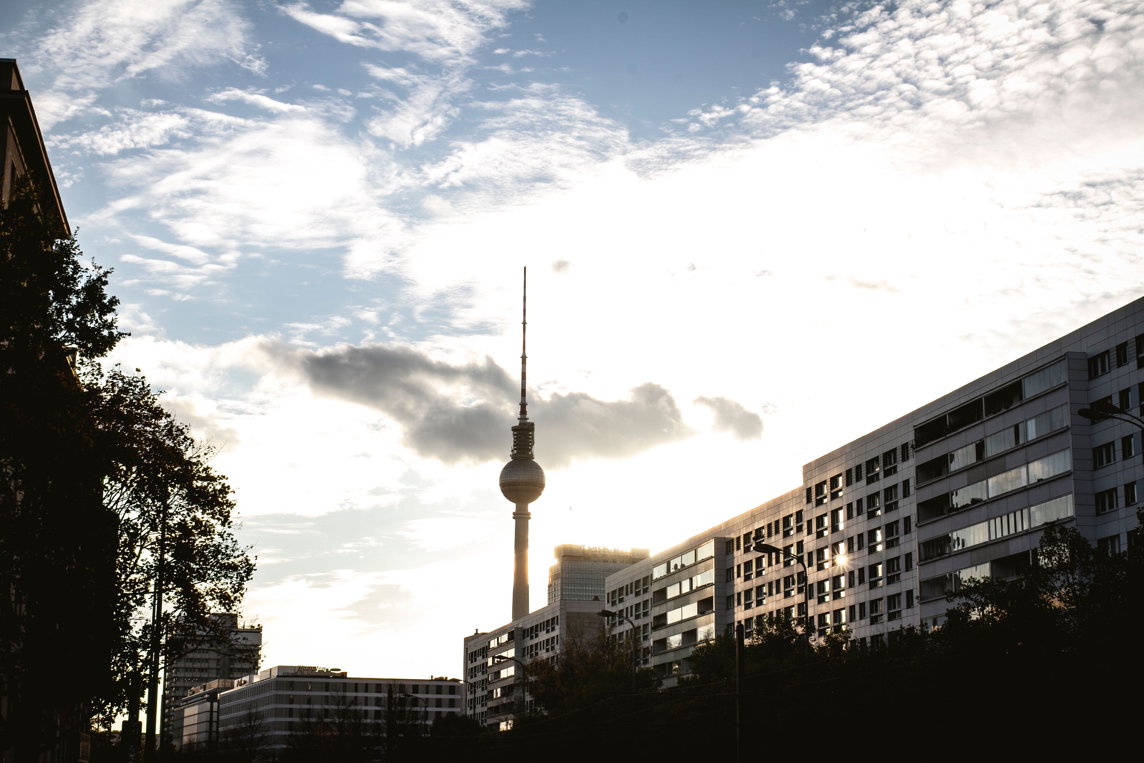Berlin TV Tower with Modern Cityscape at Sunset · Free Stock Photo