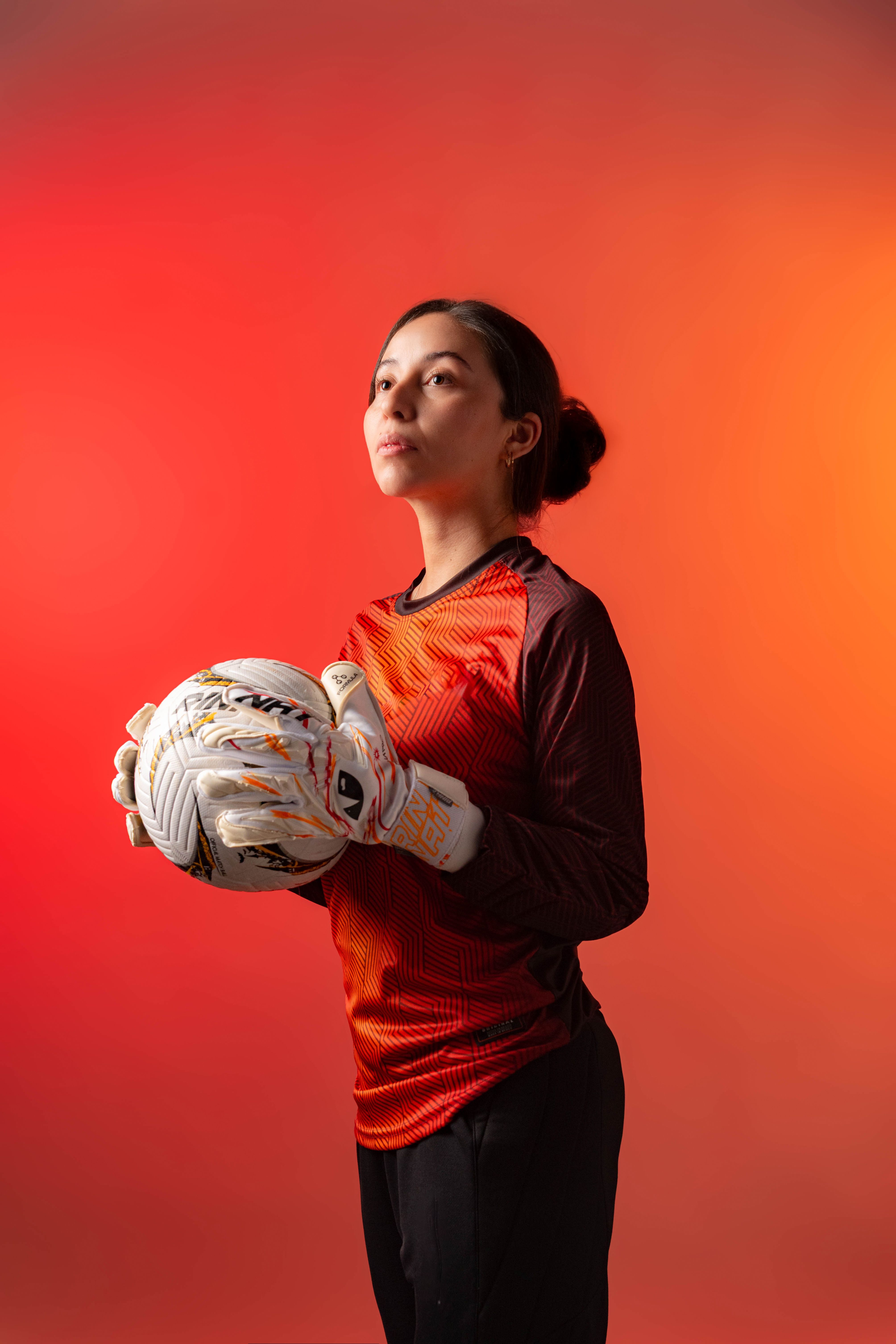 Female Soccer Goalkeeper with Gloves in Studio · Free Stock Photo