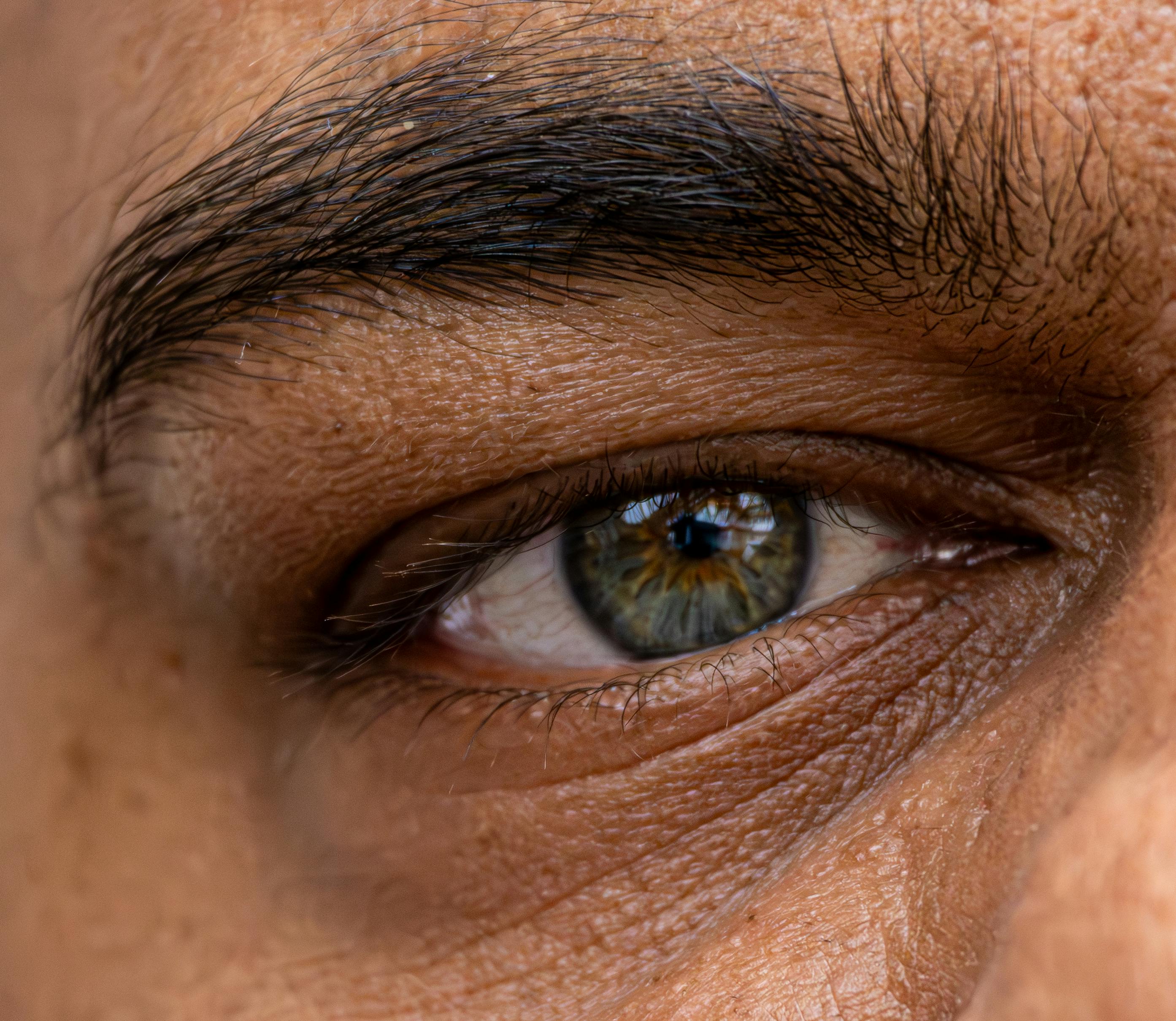 Close-Up of a Blue-Green Human Eye · Free Stock Photo