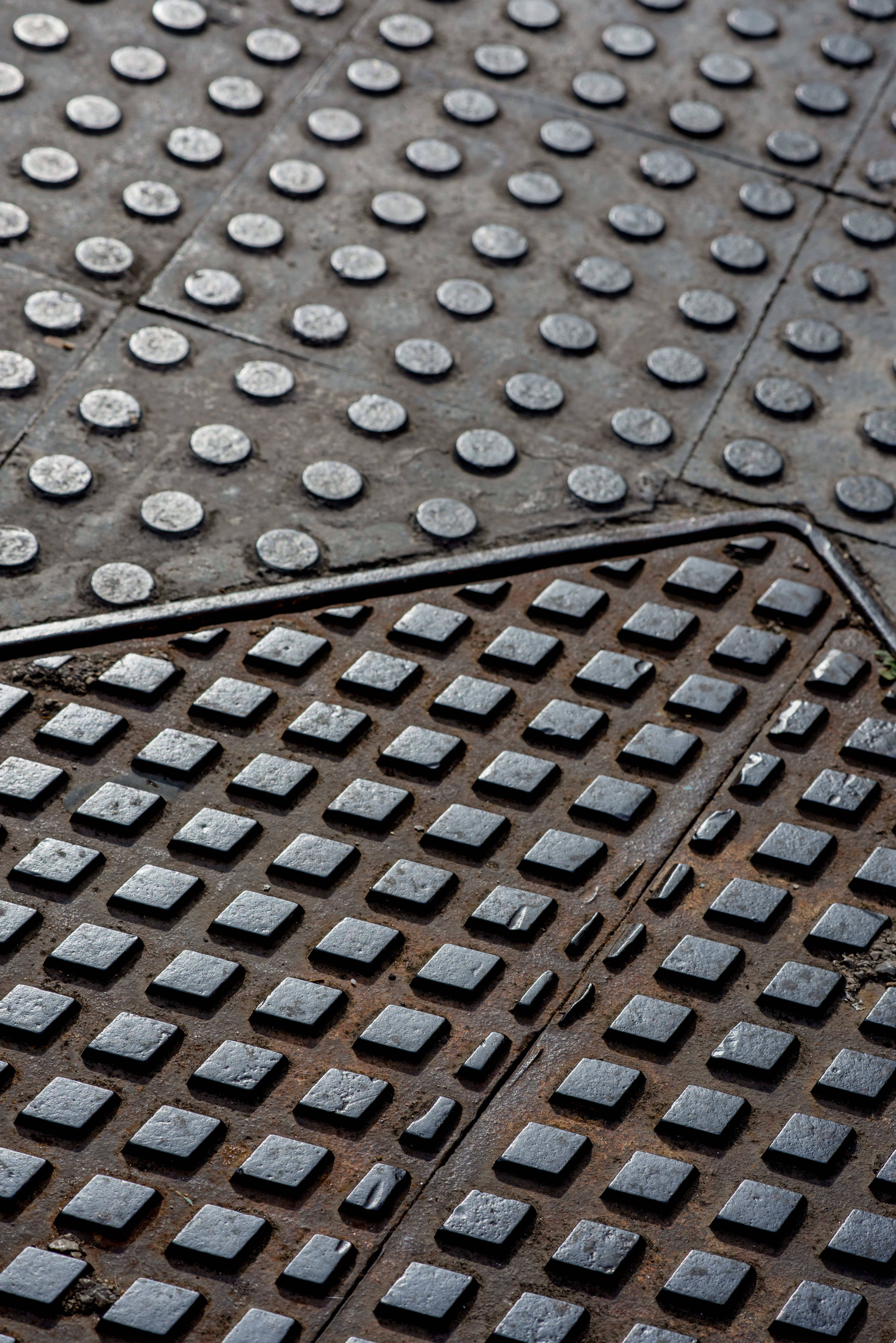 Textured Metal Sidewalk Pattern Close-Up · Free Stock Photo