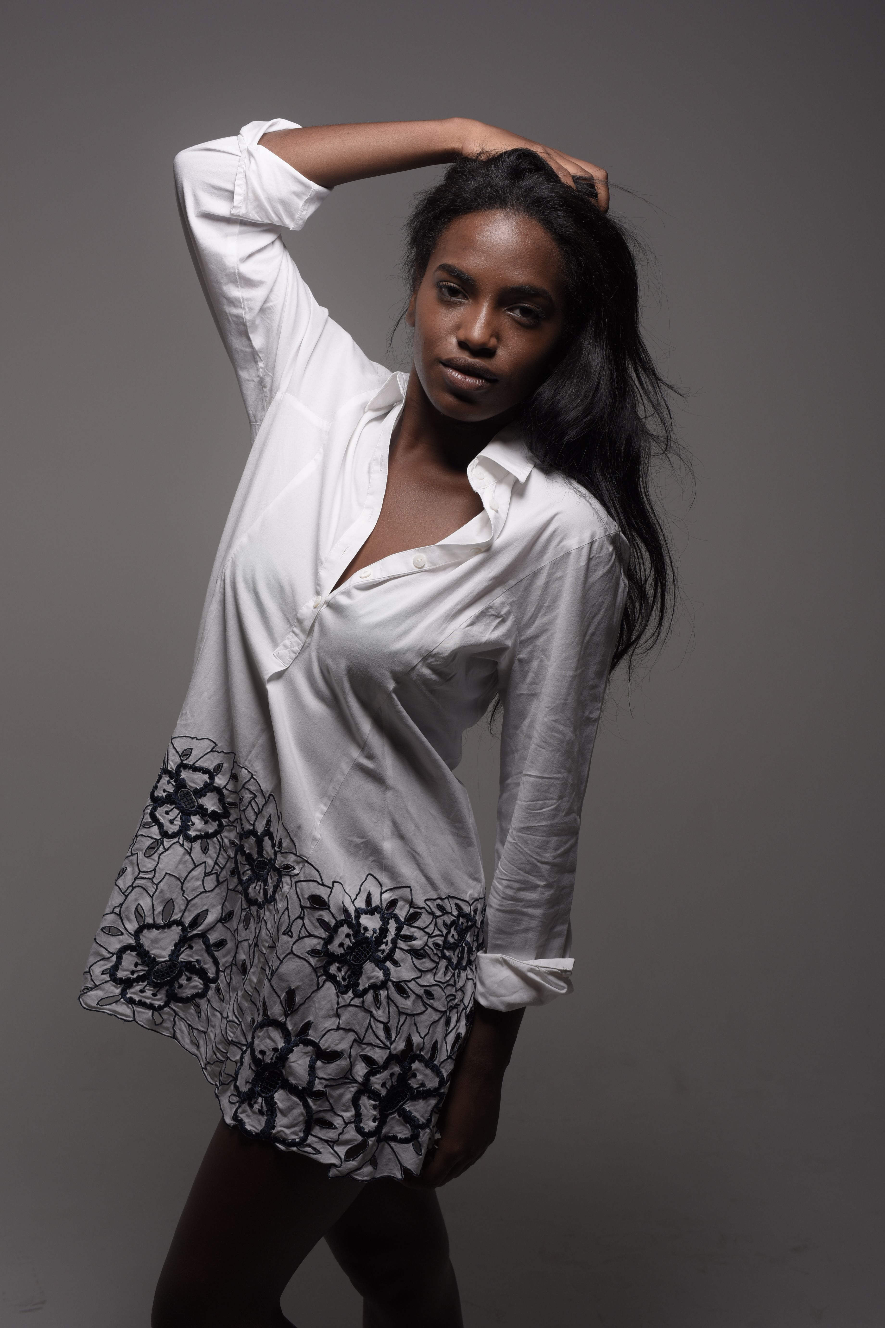 Elegant Fashion Portrait of a Woman in White Shirt · Free Stock Photo