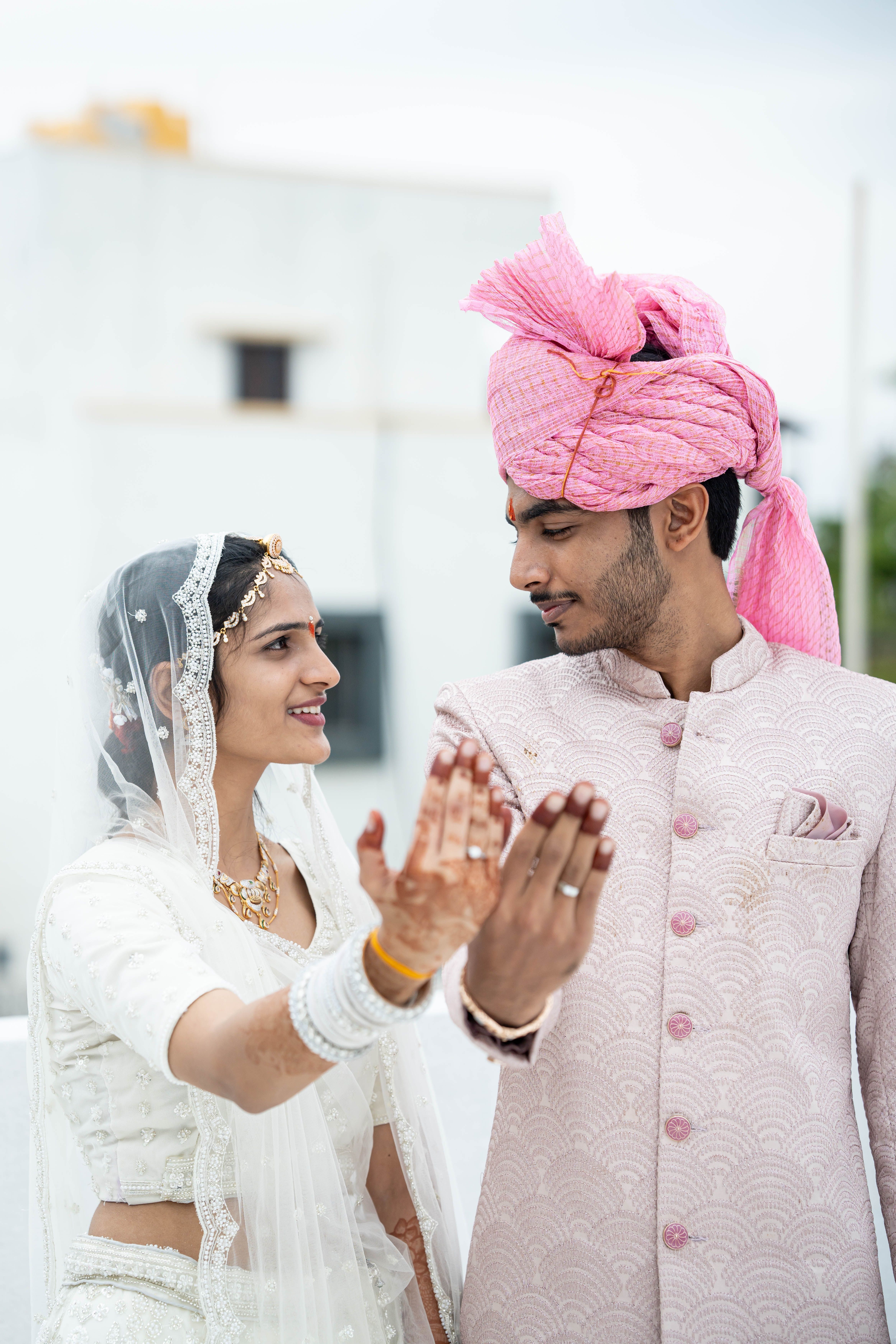 Bride and Groom in Traditional Clothing Looking at Each Other and ...
