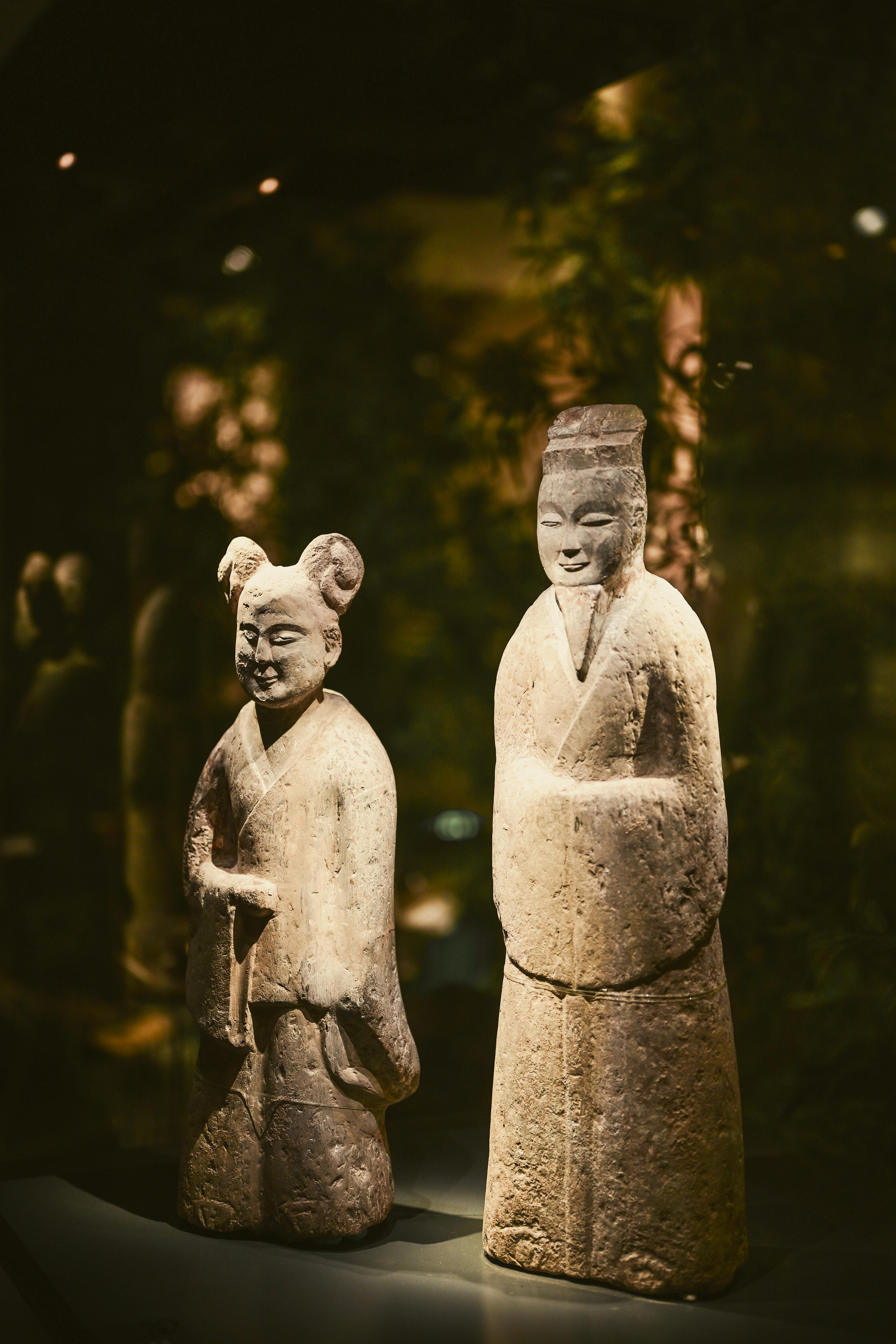 Ancient Chinese Pottery Figurines on Display · Free Stock Photo