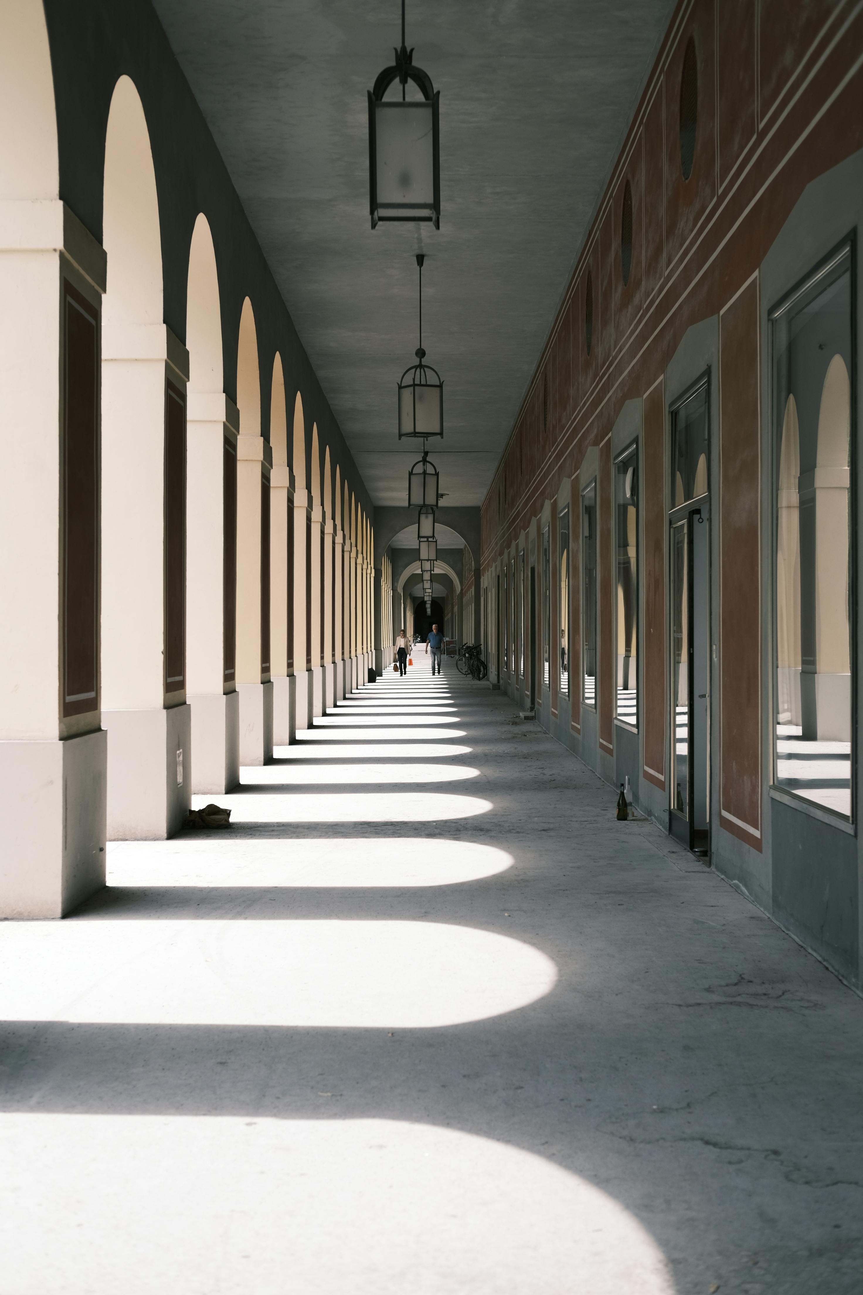 Elegant Archway Corridor in Munich, Germany · Free Stock Photo