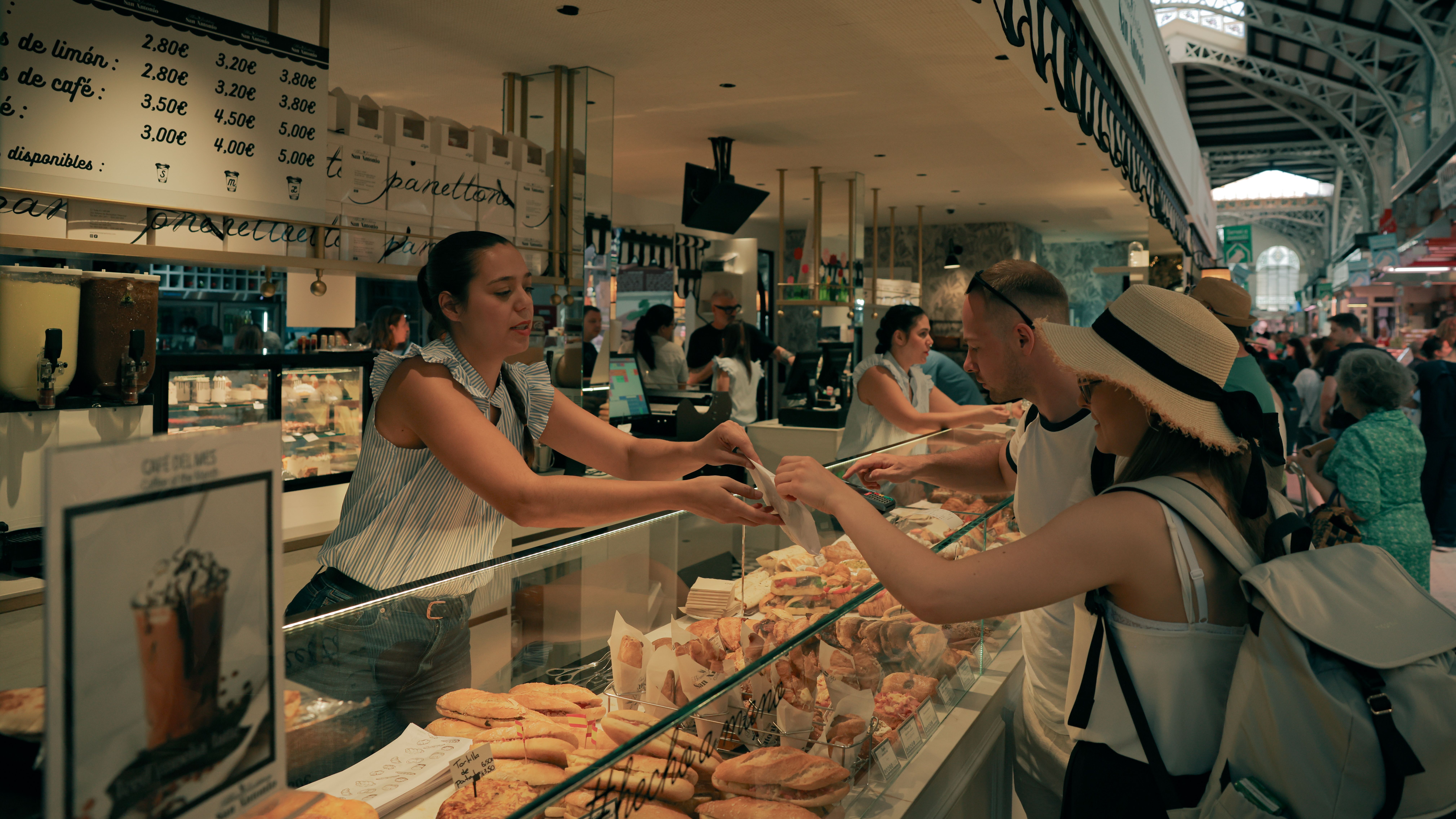 Busy Market Scene in Valencia's Central Market · Free Stock Photo