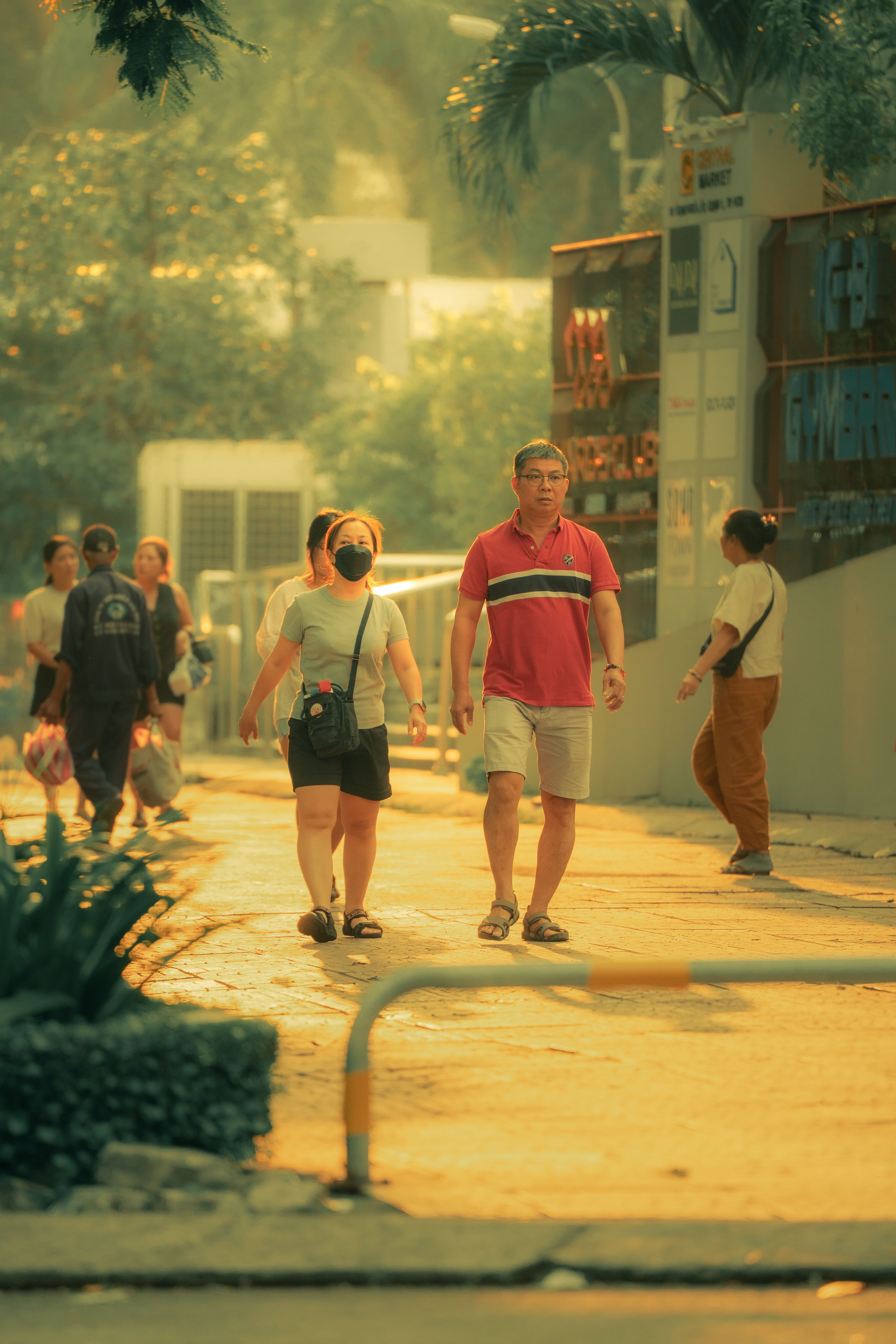 Street Scene with People Walking in Sunglow · Free Stock Photo