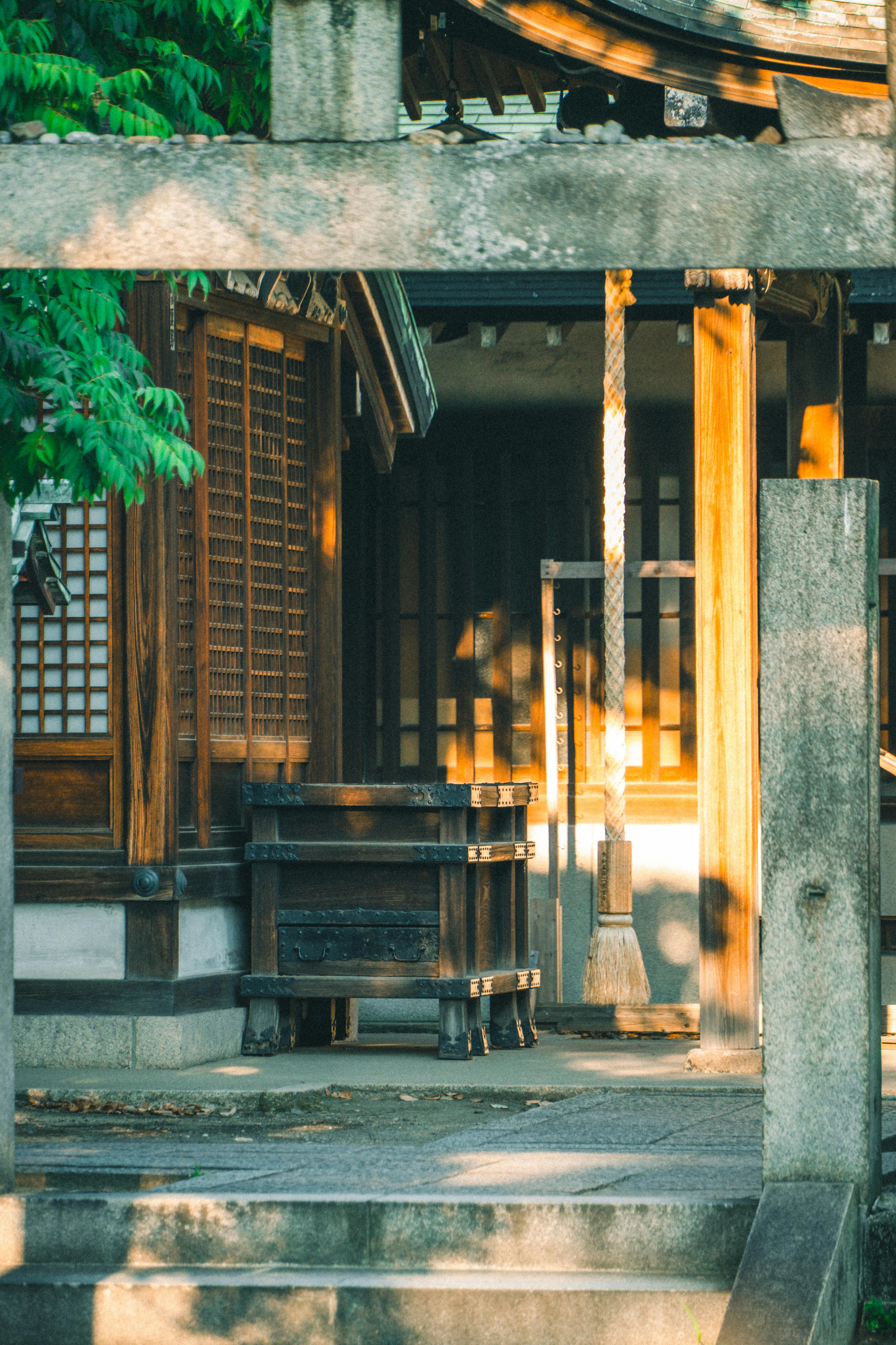 Traditional Japanese Temple Entrance in Sunlight · Free Stock Photo