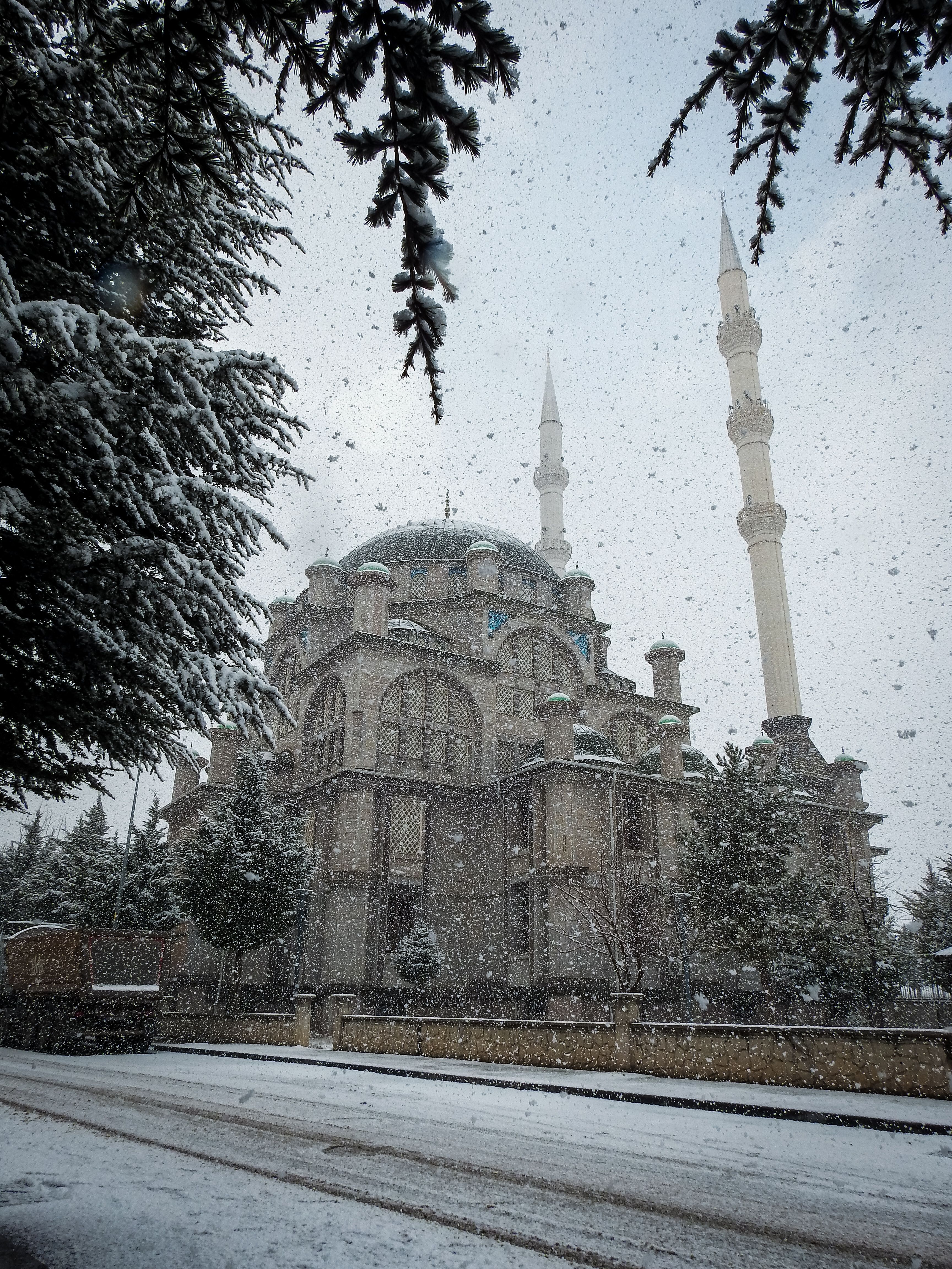 Snow-Covered Mosque Amidst Winter Scene · Free Stock Photo