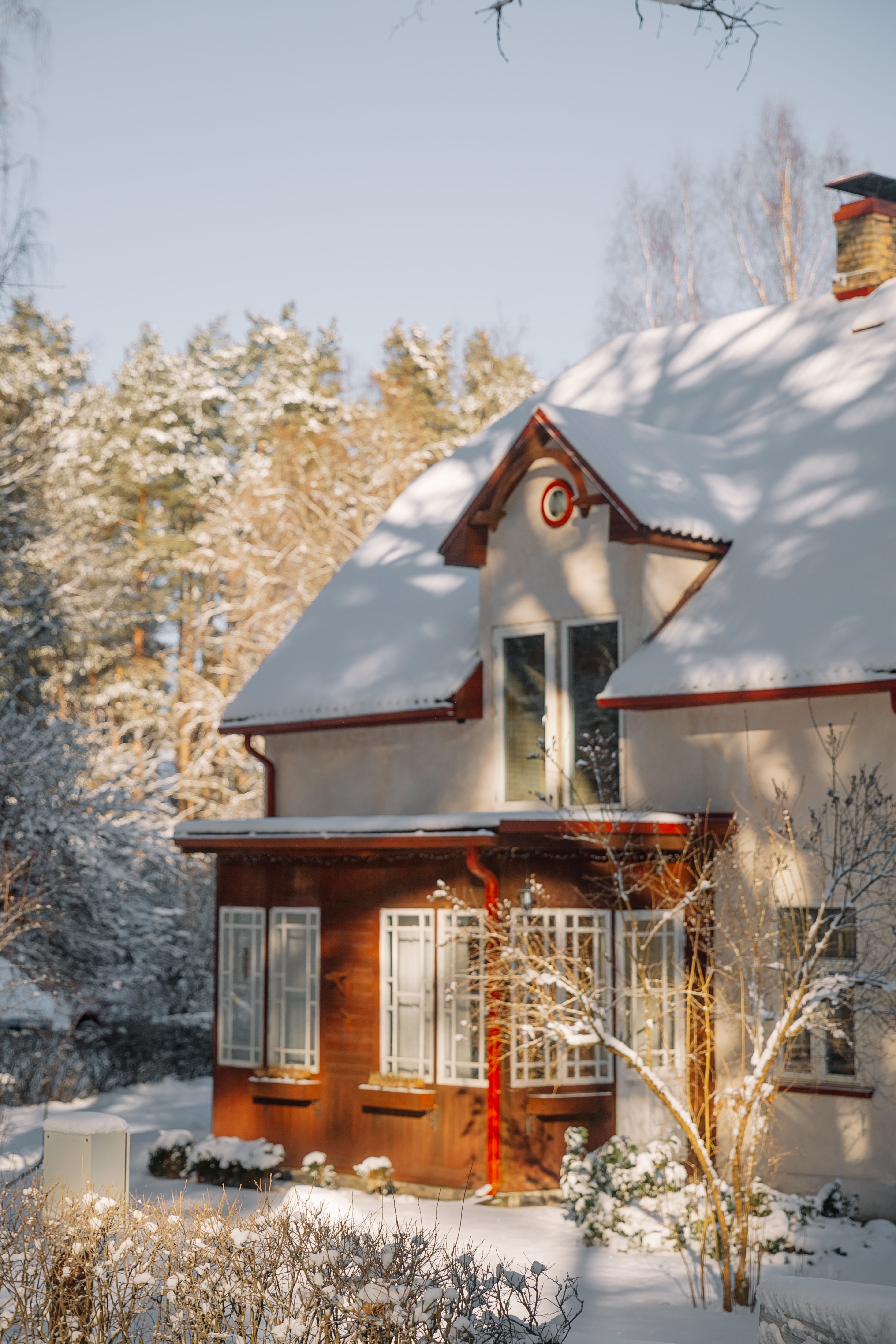 Cozy Snow-Covered Cottage in Winter Landscape · Free Stock Photo