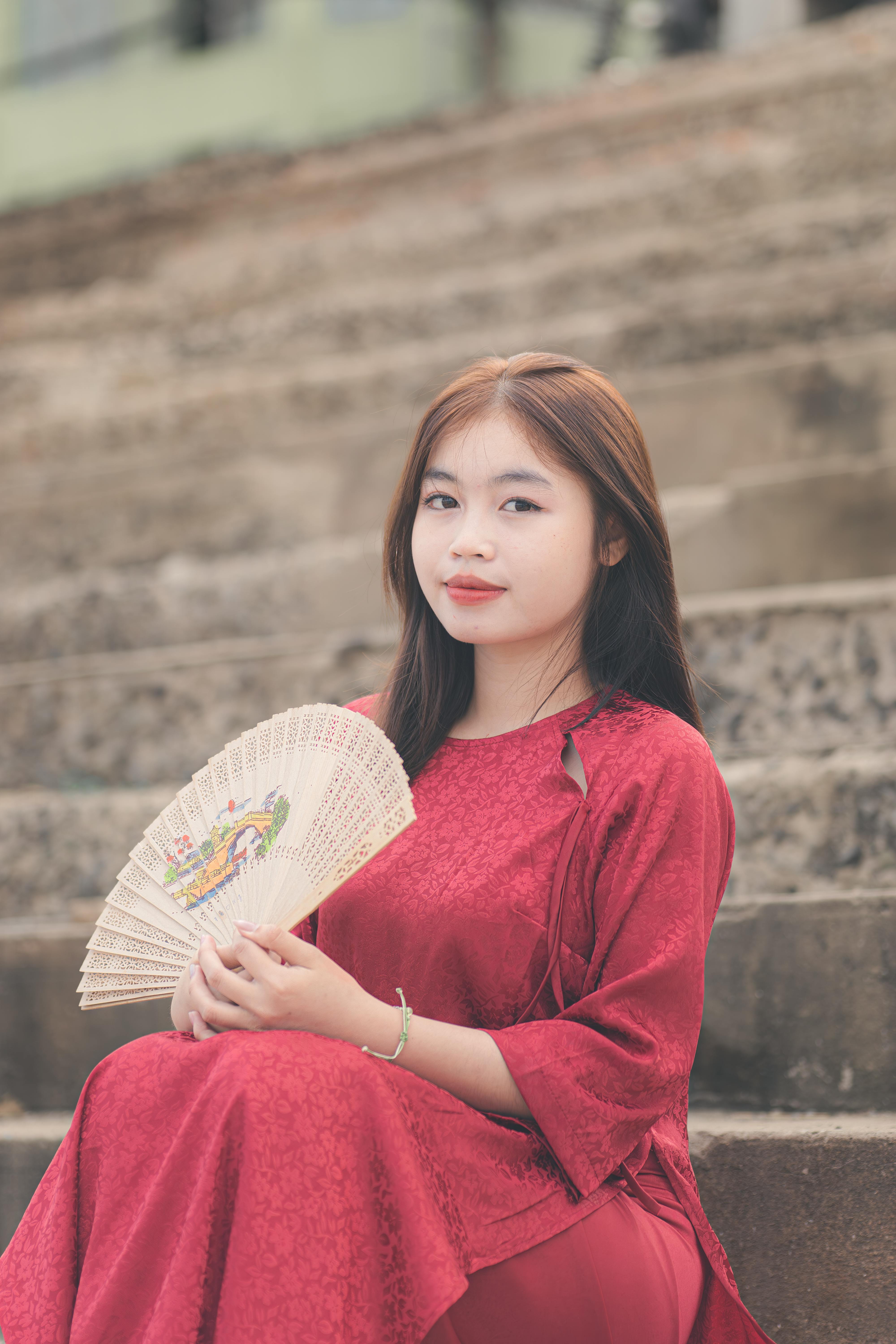 Traditional Asian Woman in Red Dress Holding Fan · Free Stock Photo