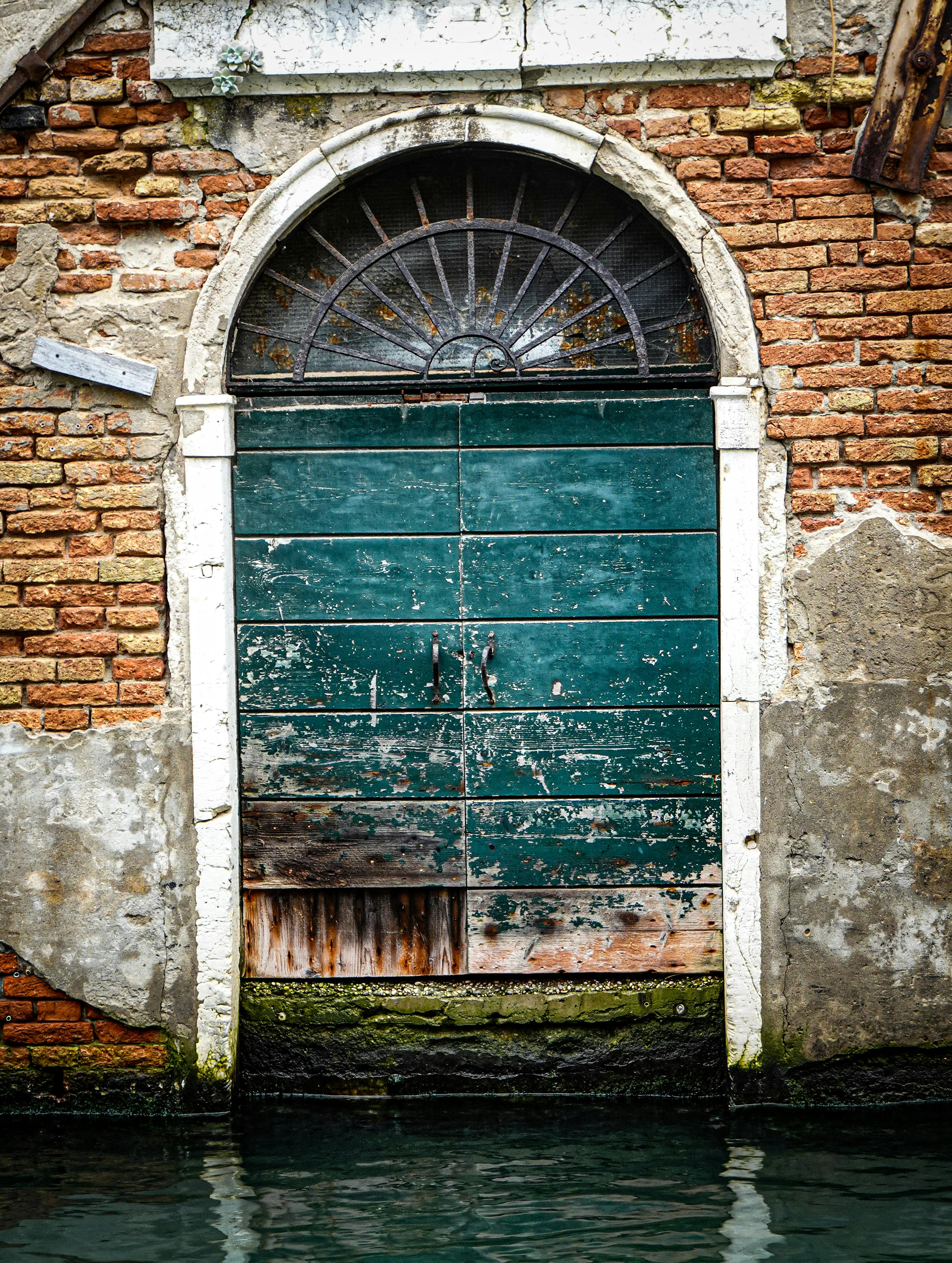 Rustic Arched Doorway in Venice, Italy · Free Stock Photo