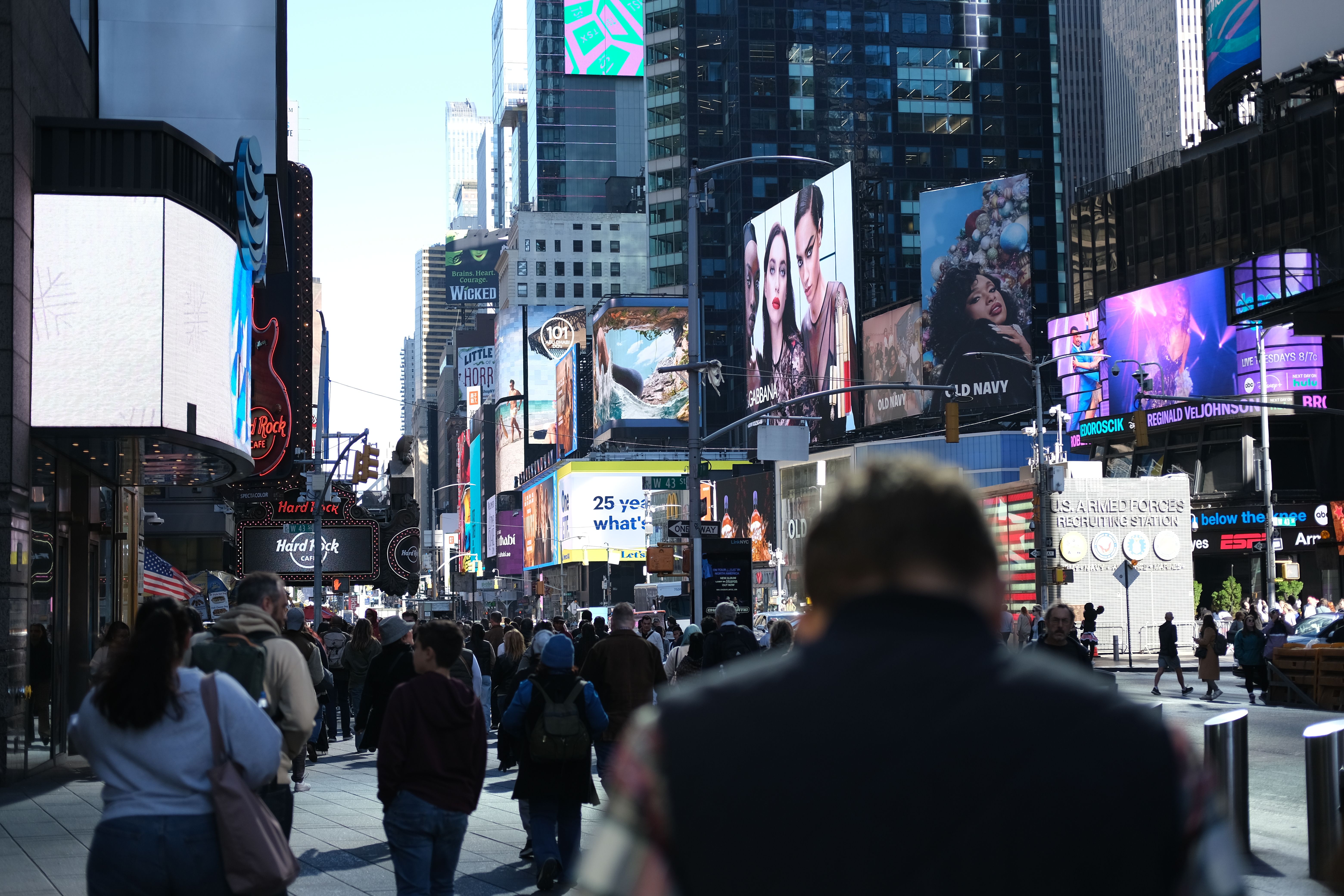Bustling Times Square with Iconic Neon Lights · Free Stock Photo