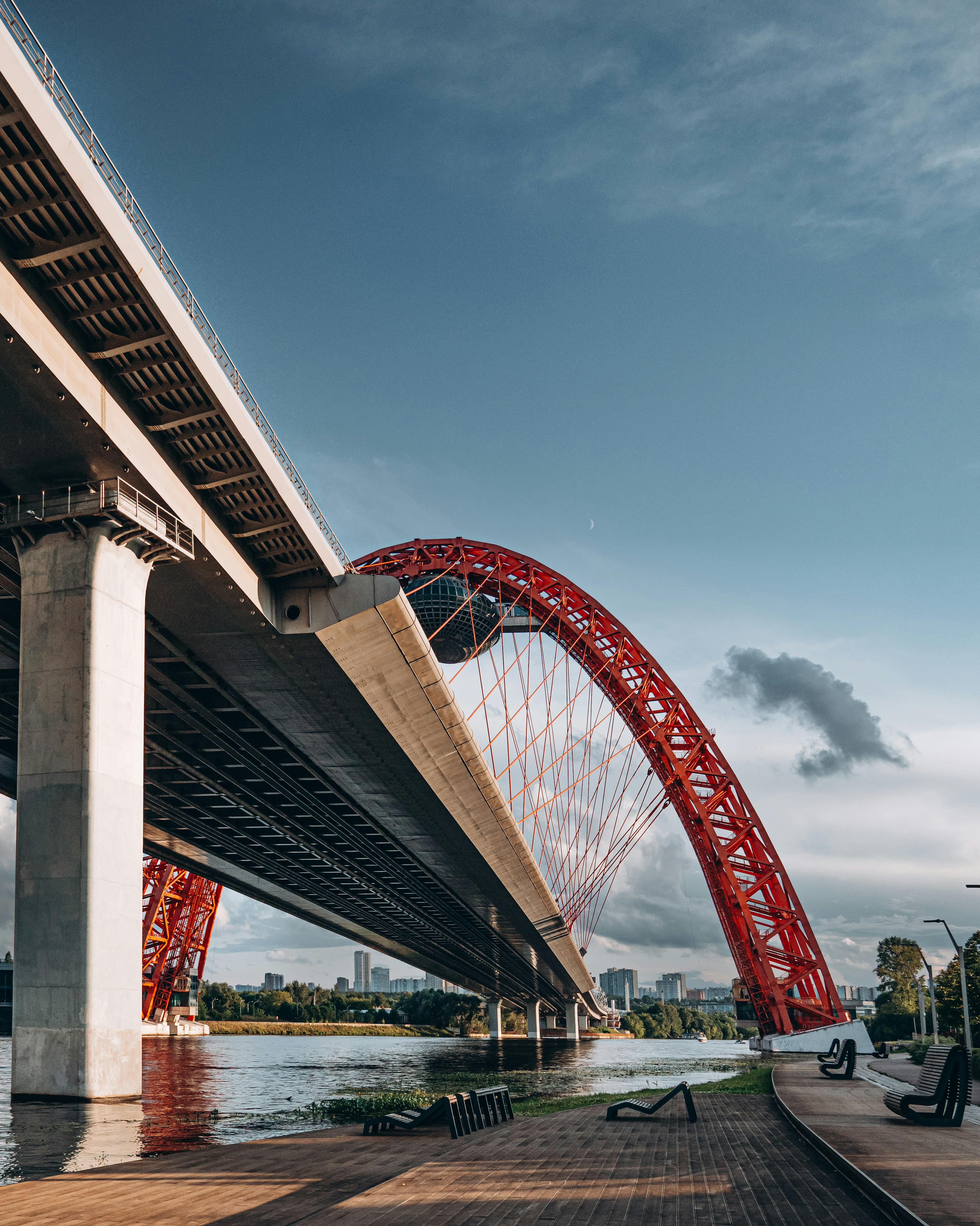 Modern Red Arch Bridge Over a River in Moscow · Free Stock Photo