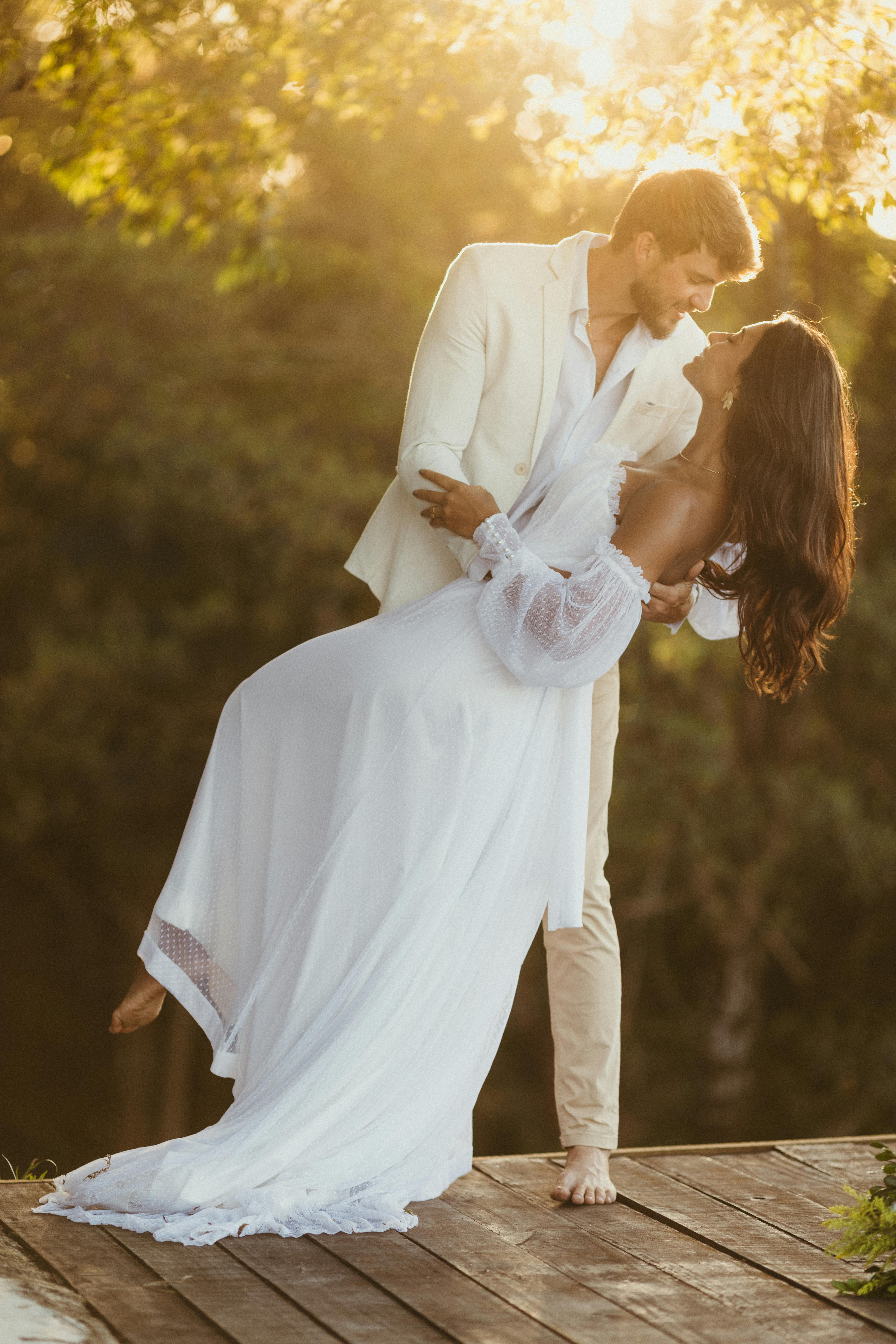 Romantic Couple Dancing in Nature at Sunset · Free Stock Photo