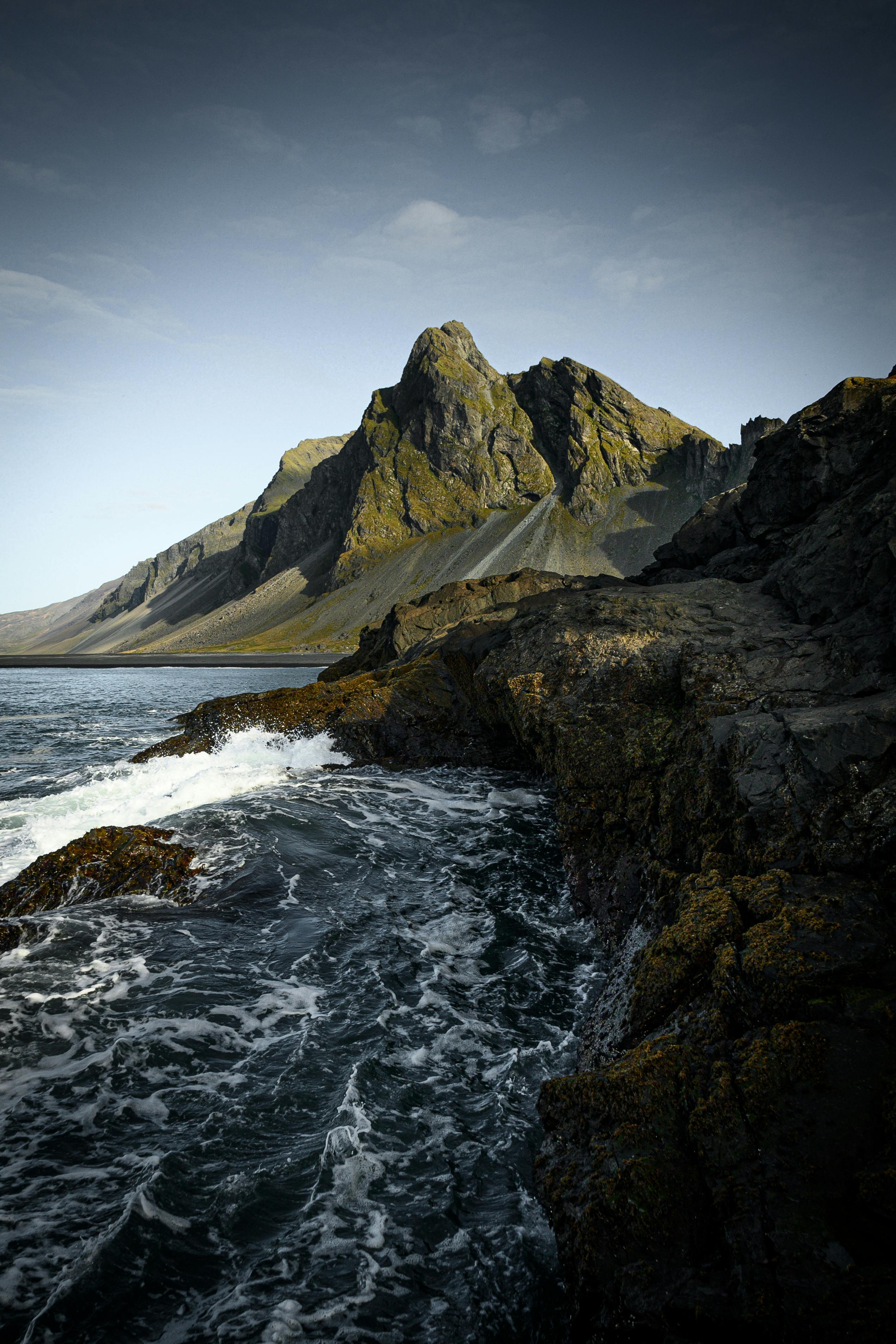 2 Green-and-gray Islet on Body of Water · Free Stock Photo