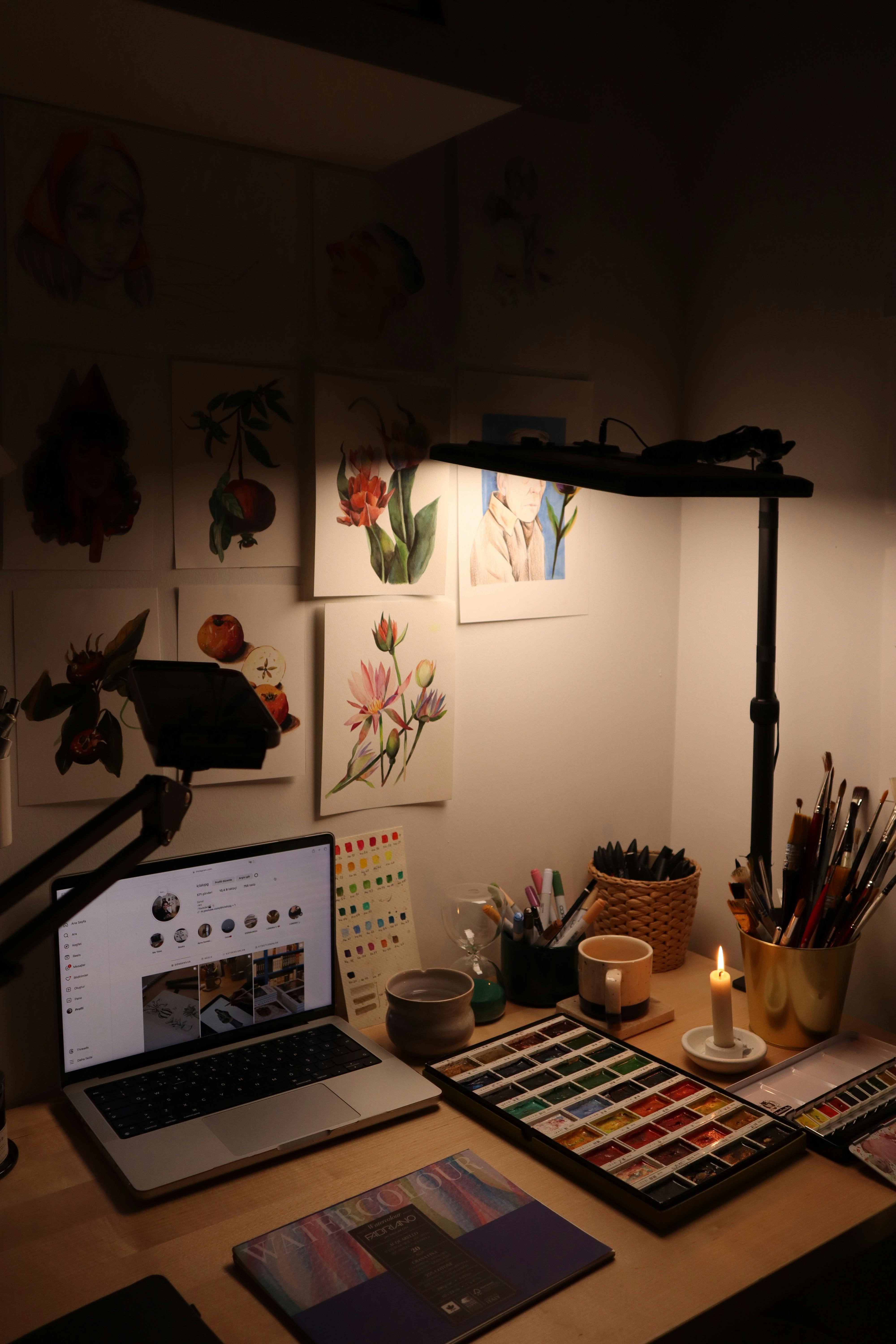 Cozy Artistic Workspace with Watercolor Setup · Free Stock Photo