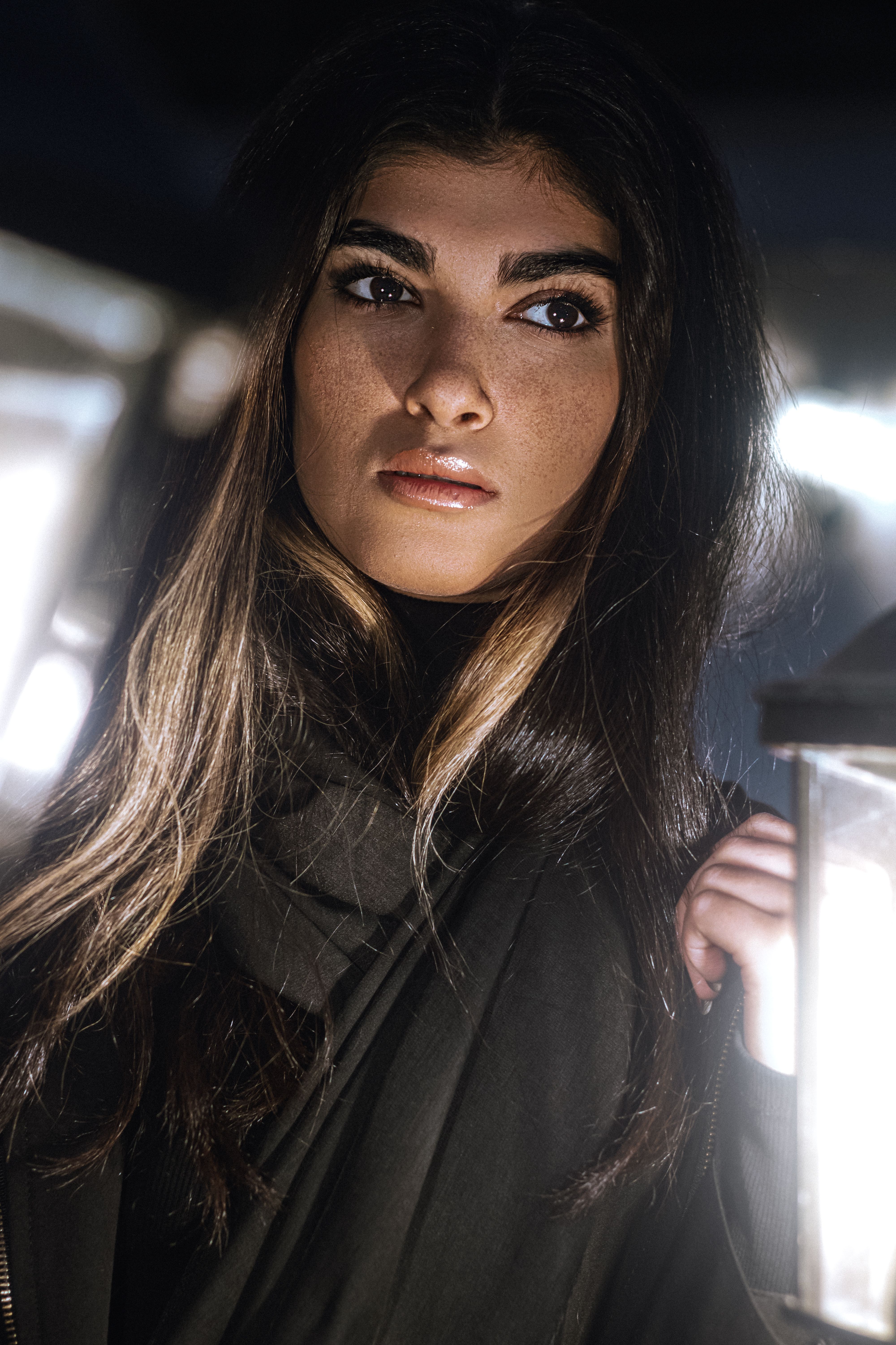 Portrait of a Woman with Dramatic Lighting · Free Stock Photo