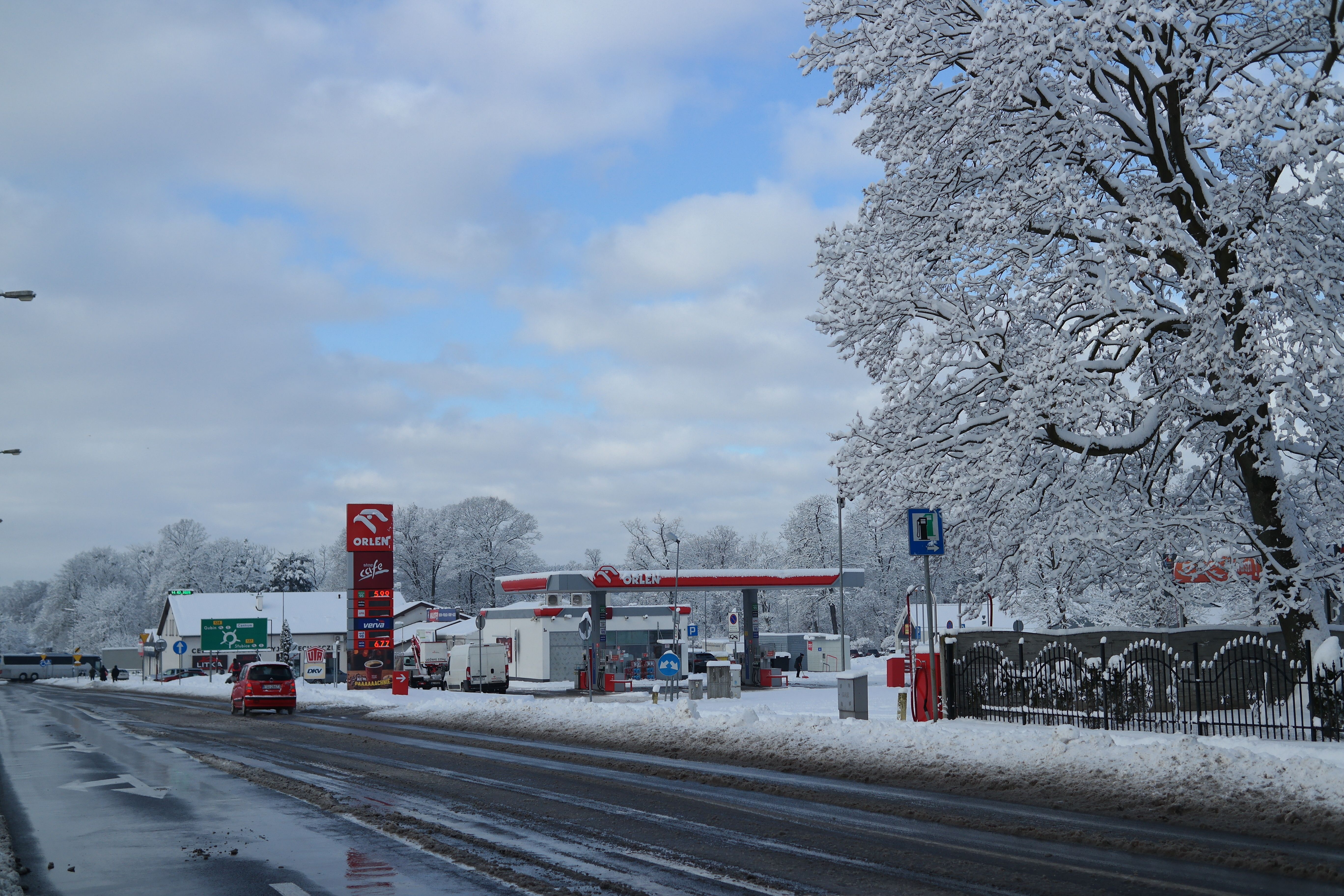 Snowy Winter Day at Orlen Gas Station · Free Stock Photo