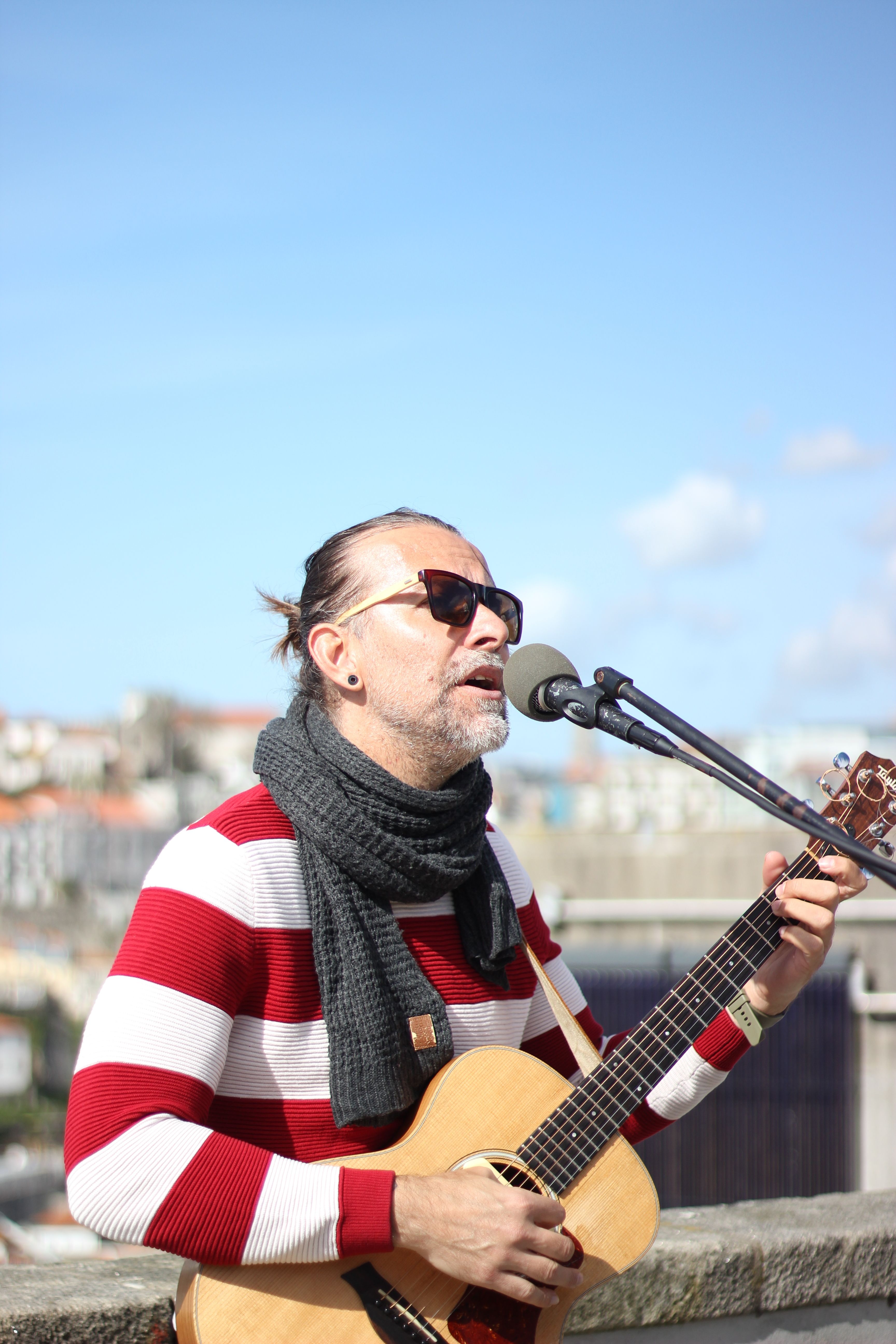 Street Musician Performing in Porto, Portugal · Free Stock Photo