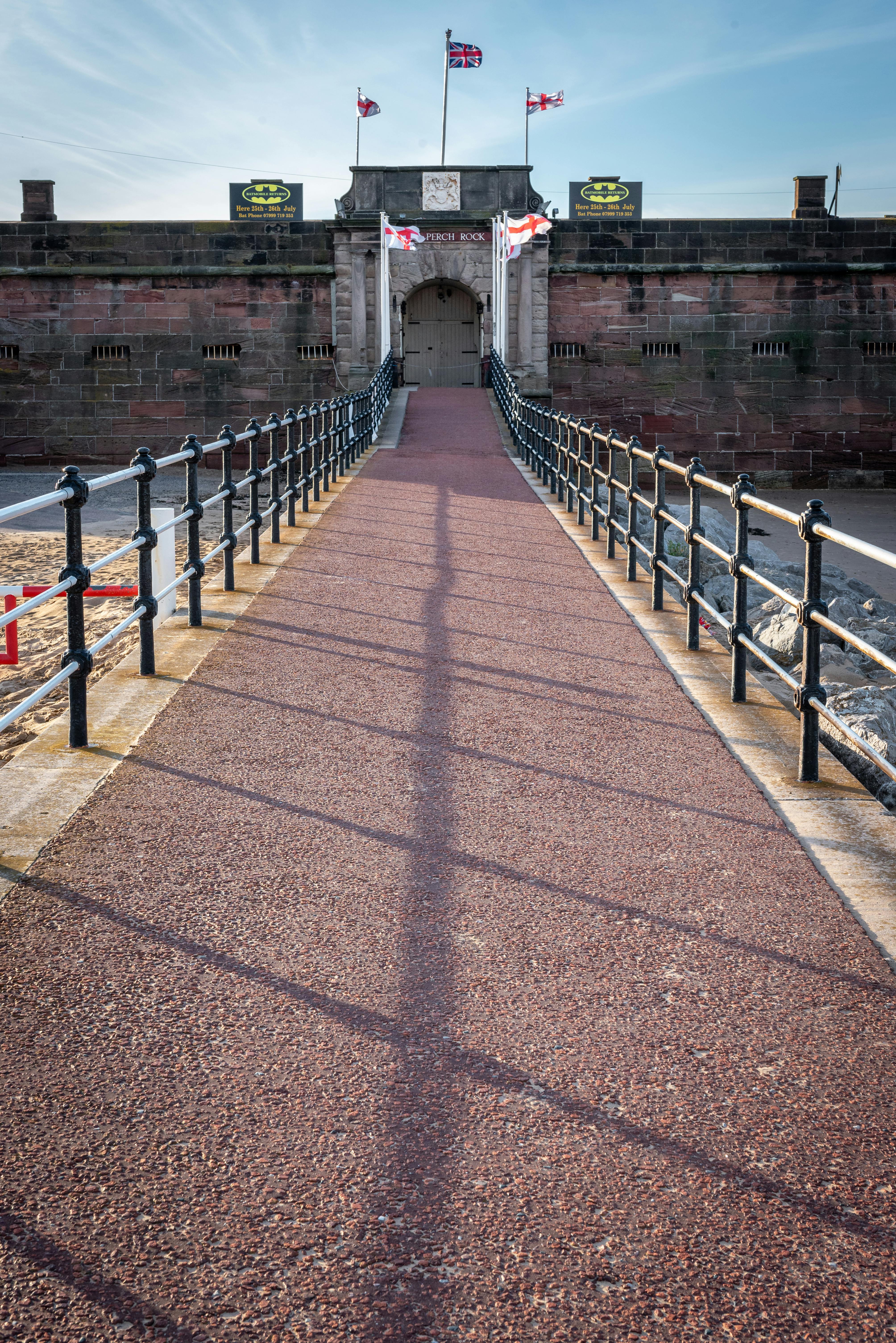 Fort Perch Rock with Pathway and UK Flags · Free Stock Photo