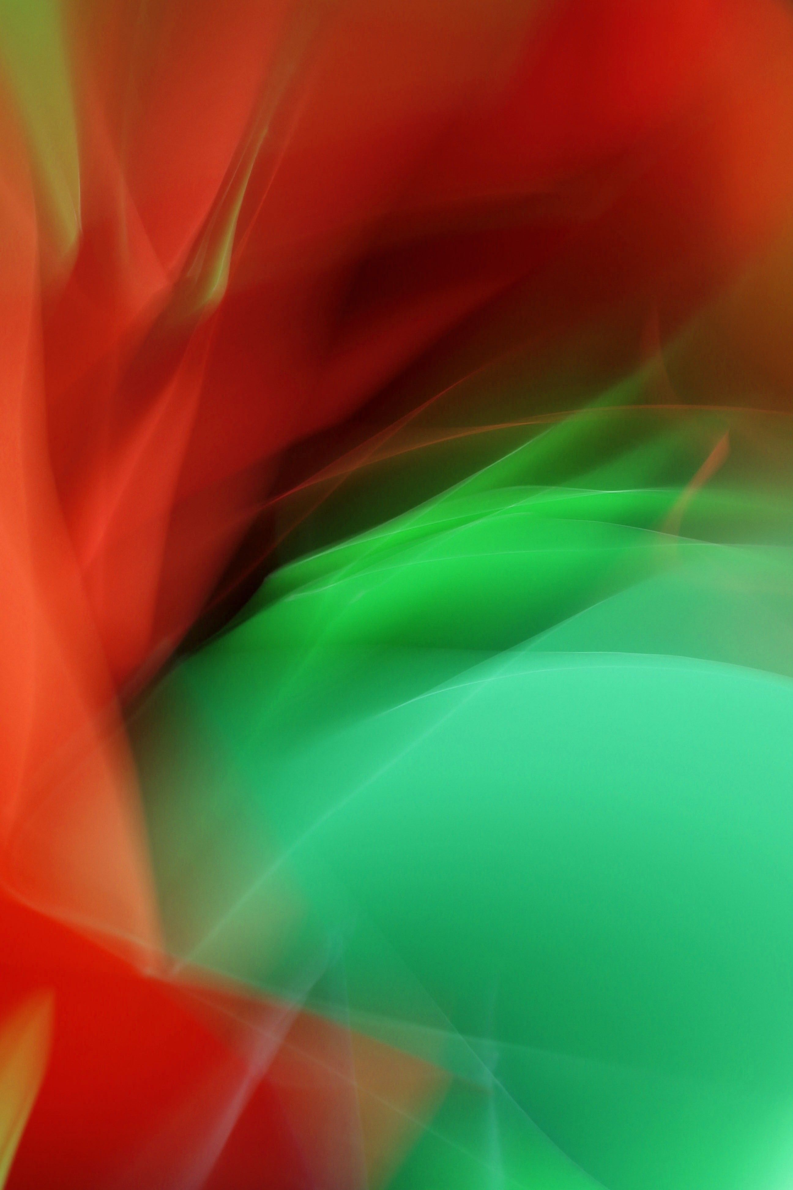 Vibrant Abstract Art with Red and Green Swirls · Free Stock Photo