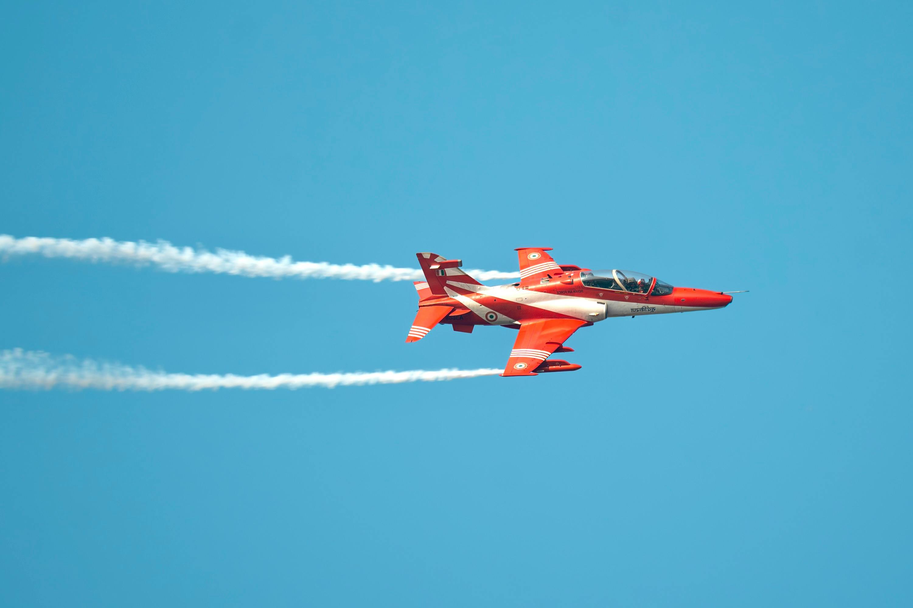 Red and White Fighter Jet in Flight at Airshow · Free Stock Photo