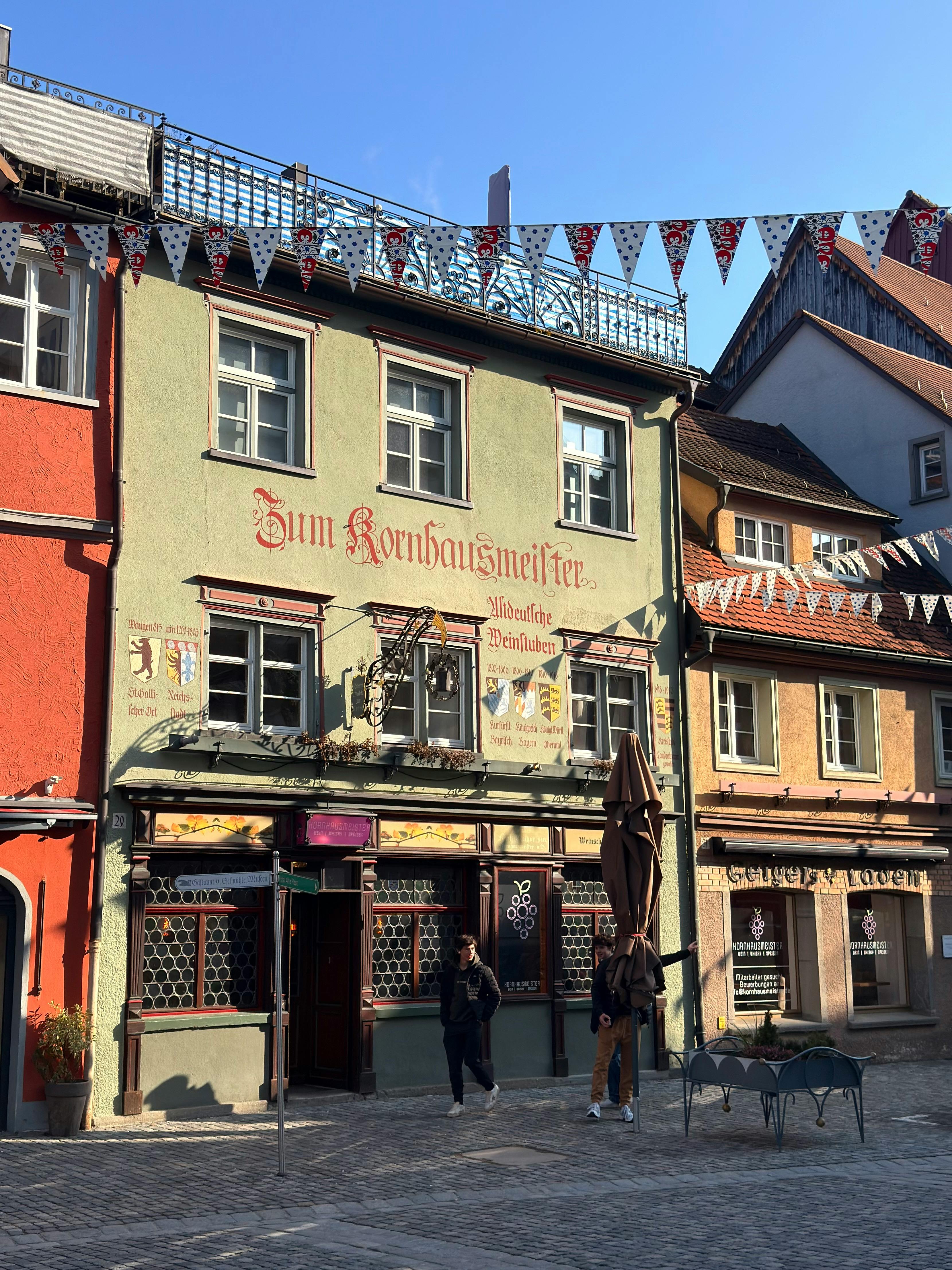 Charming Historic German Street Scene with Cafe · Free Stock Photo