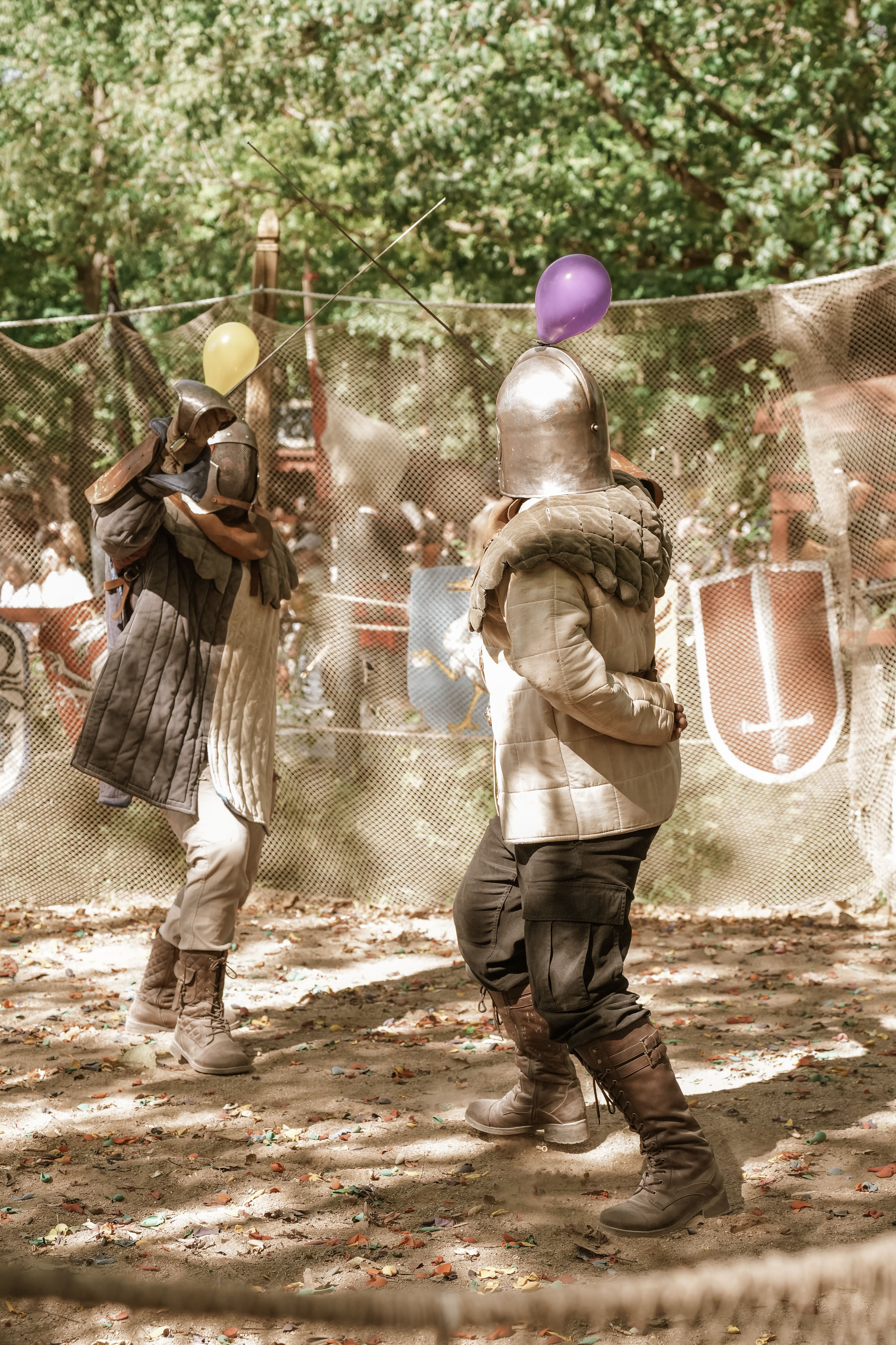 Medieval Knight Combat with Balloon Helmets Outdoors · Free Stock Photo