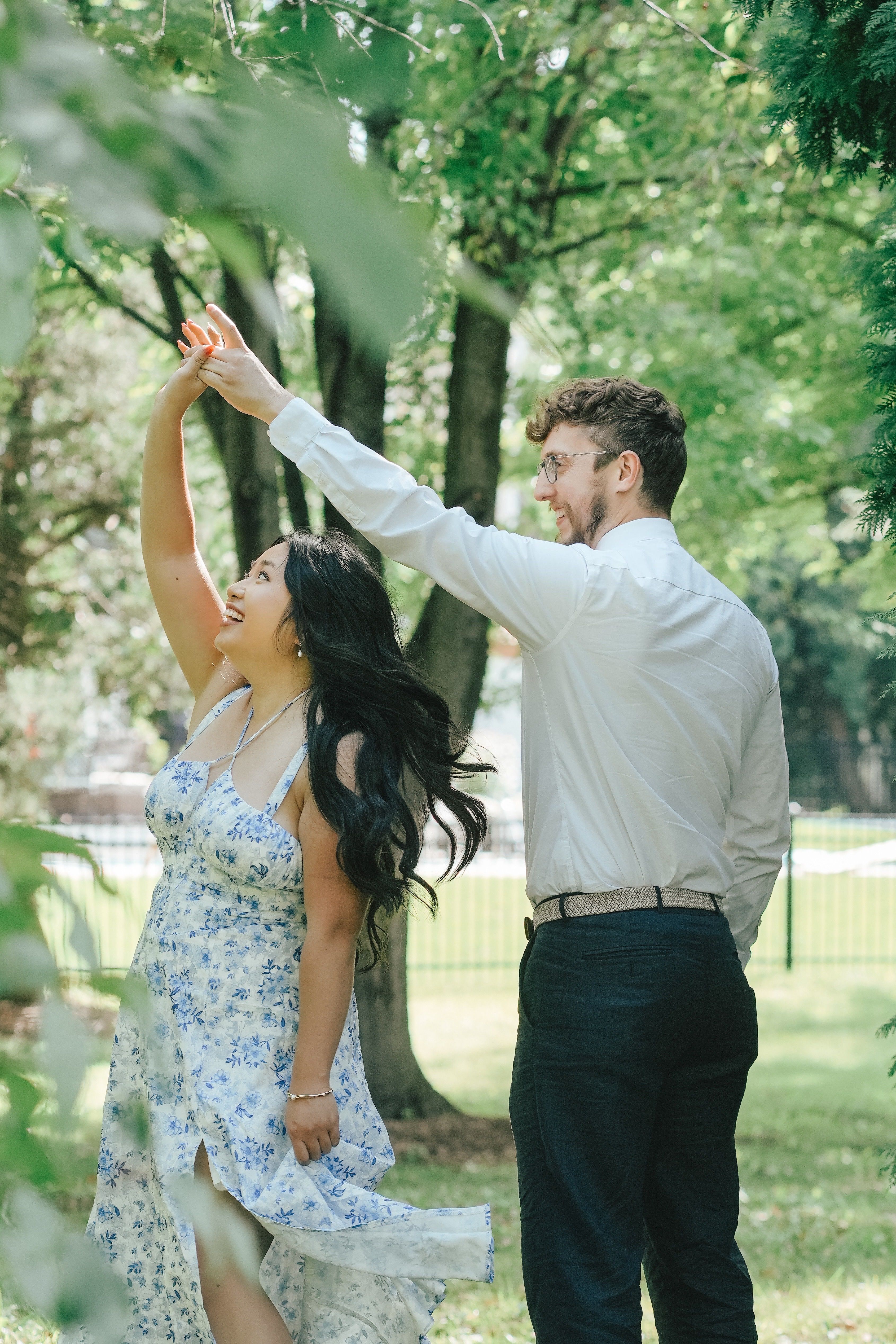 Couple Dancing Happily in a Sunny Park · Free Stock Photo