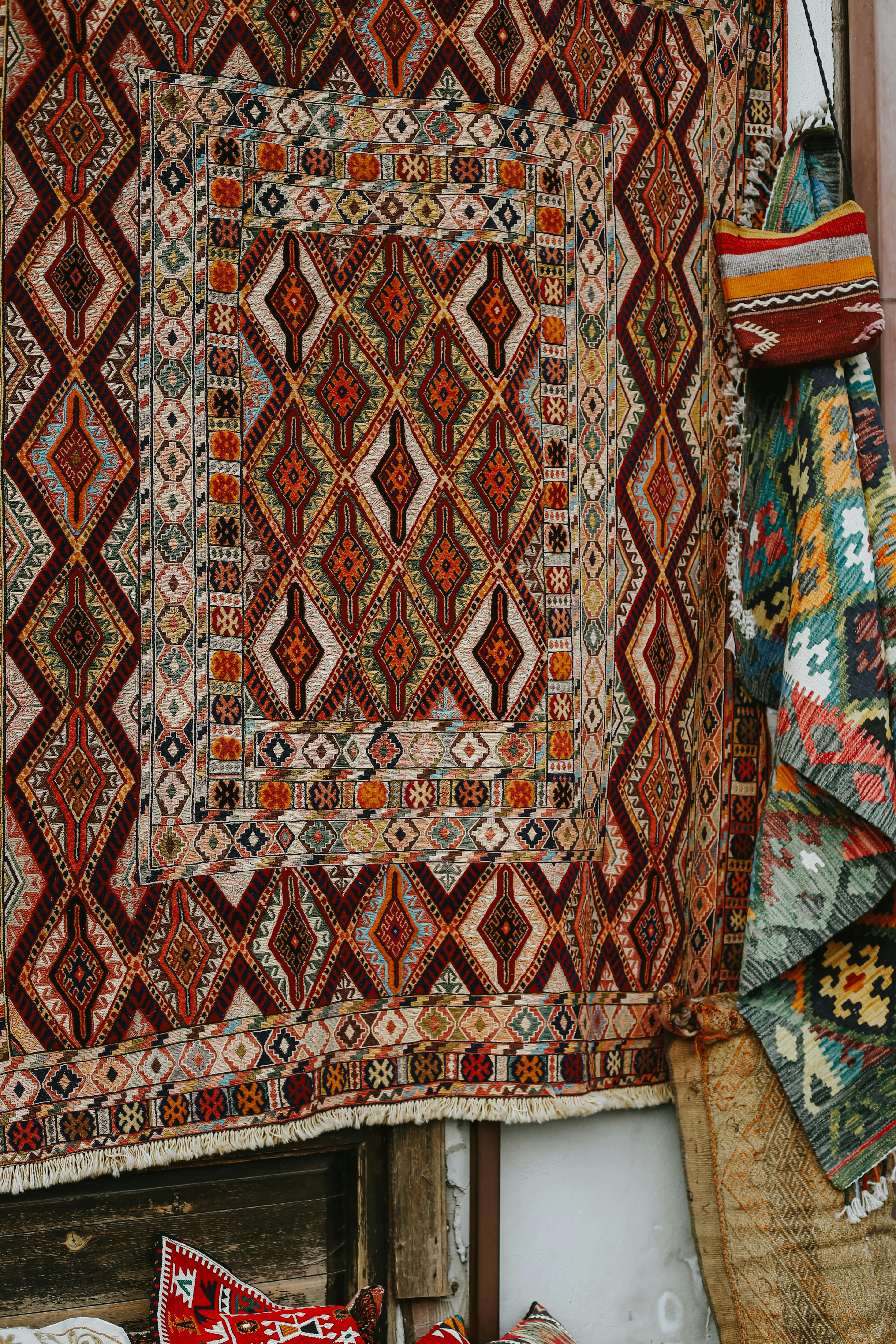 Colorful Traditional Middle Eastern Rug Display · Free Stock Photo