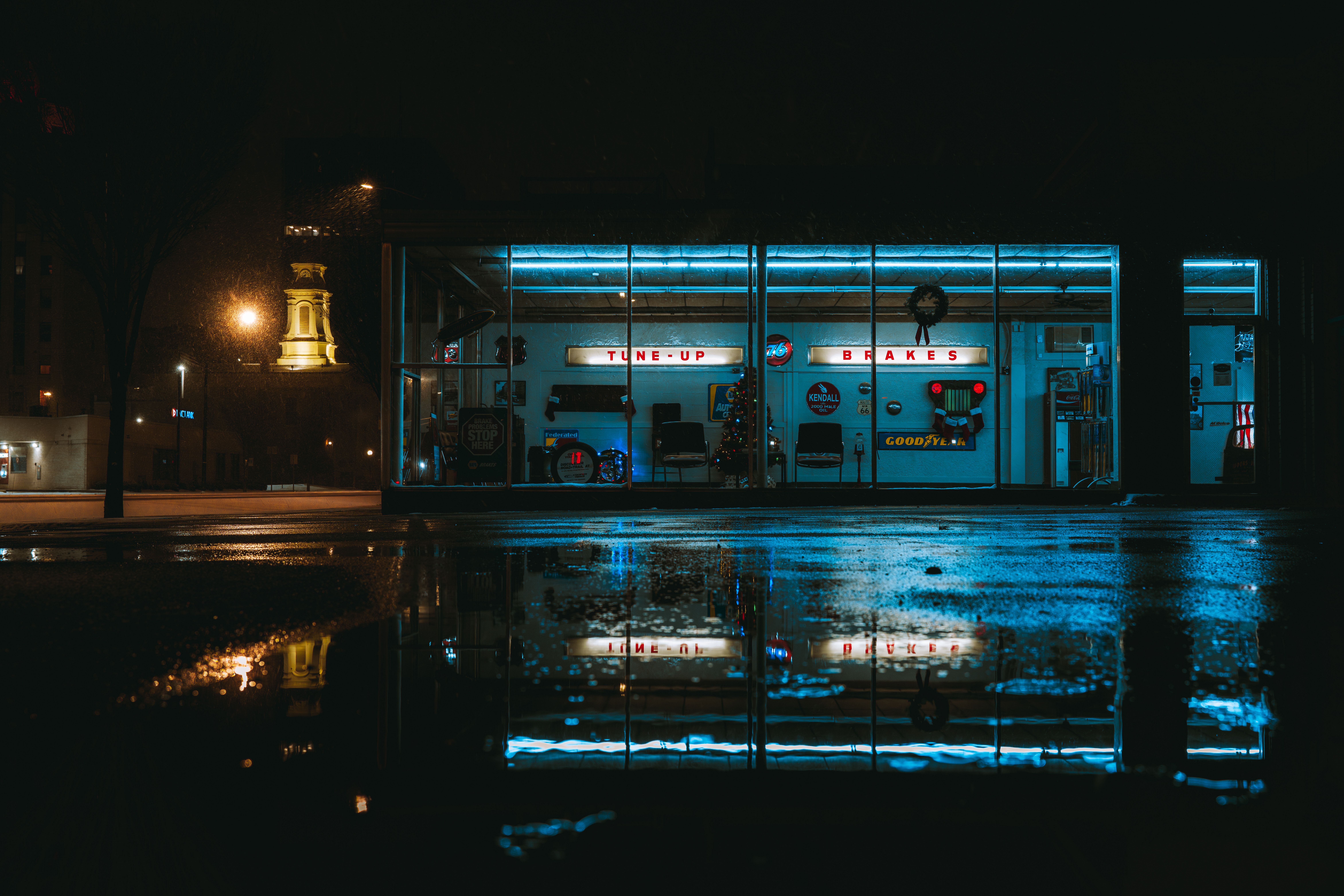Neon-lit Garage at Night with Reflections · Free Stock Photo