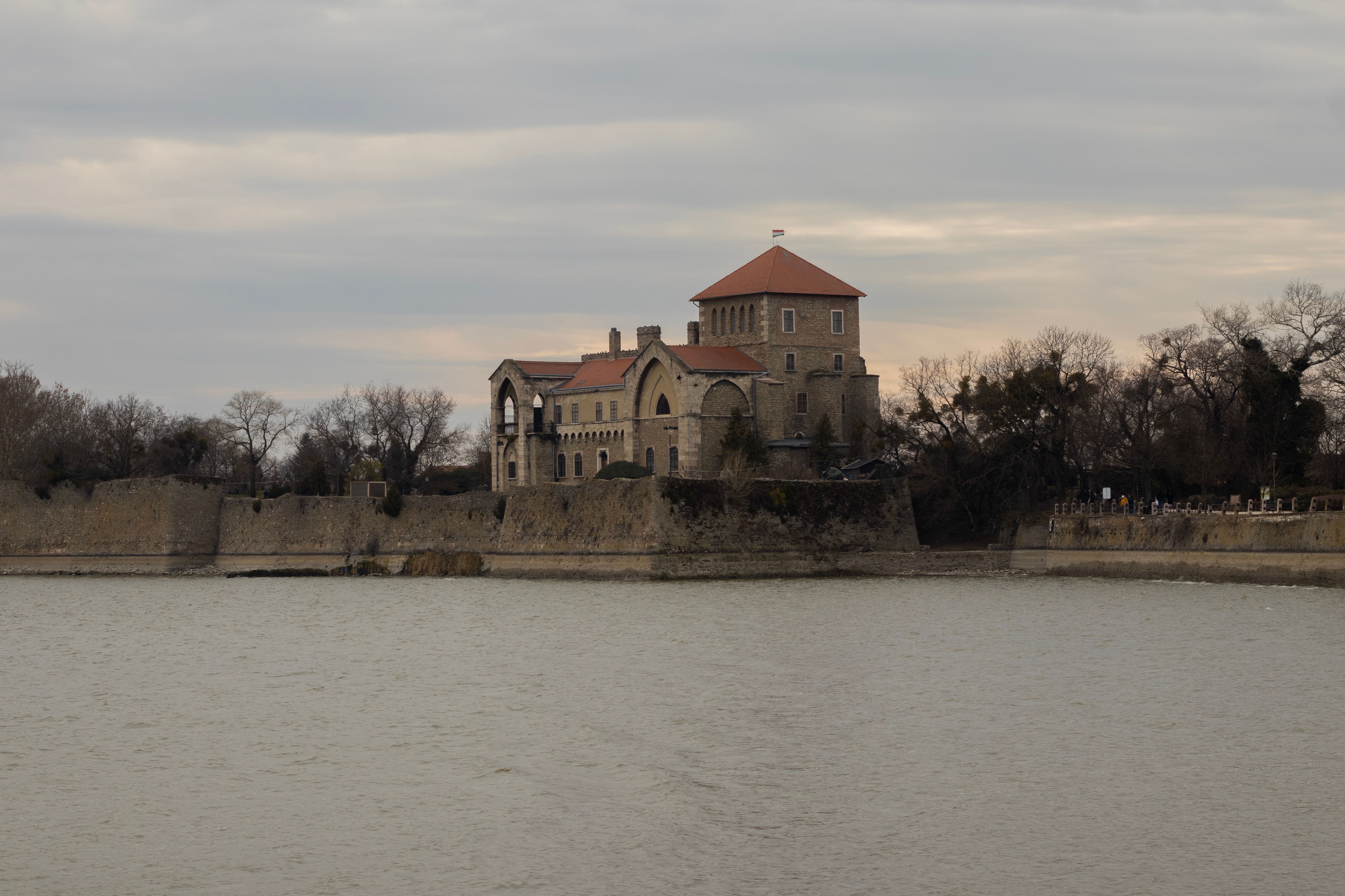 Historic Castle on Riverside with Dramatic Sky · Free Stock Photo
