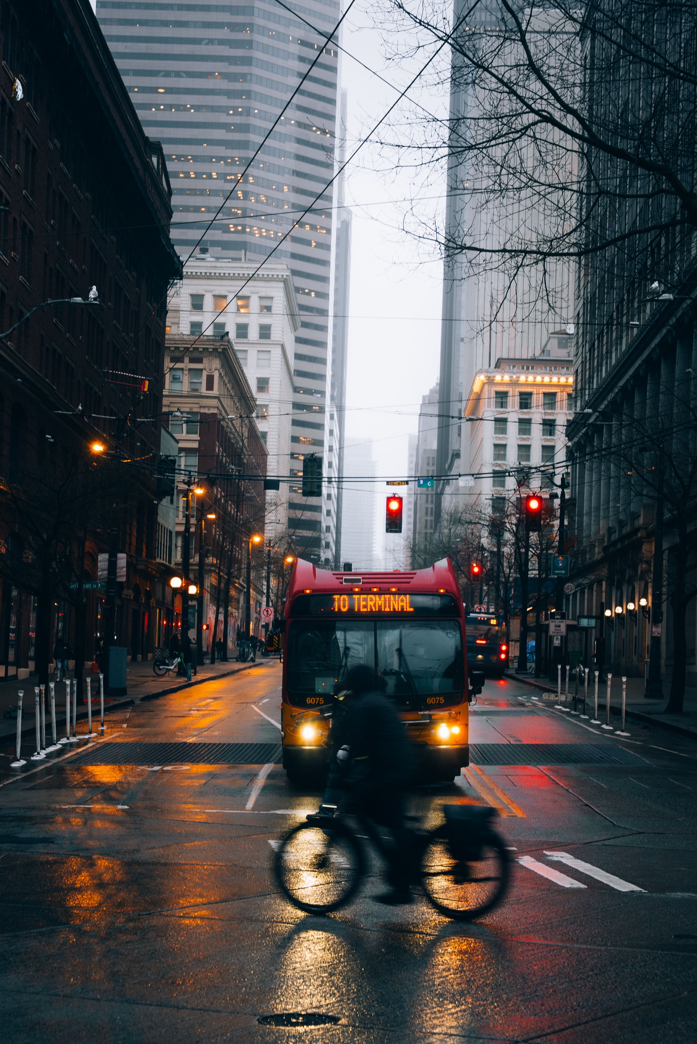 Moody Seattle Urban Street with Cyclist · Free Stock Photo