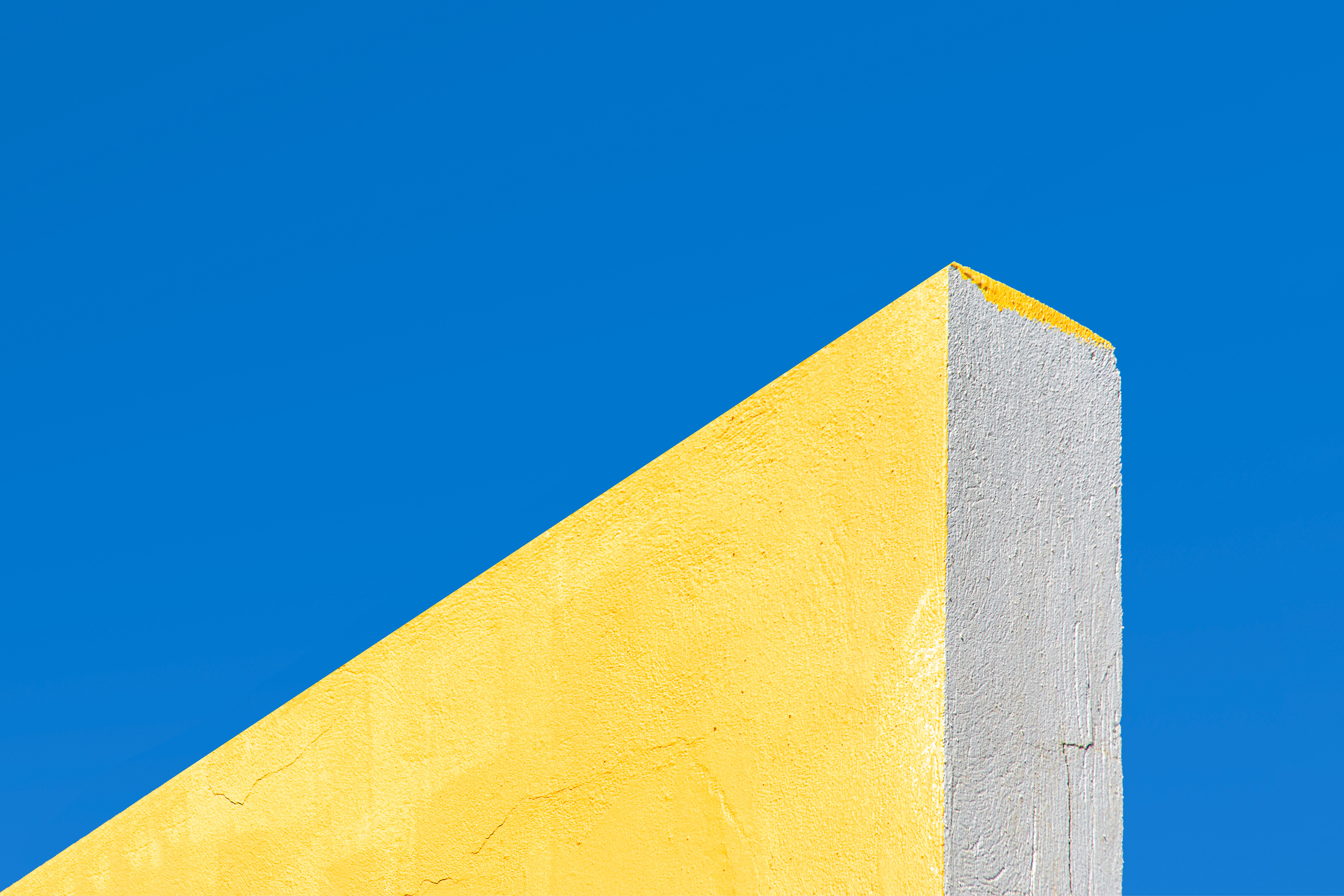Abstract Yellow Structure Against Blue Sky · Free Stock Photo