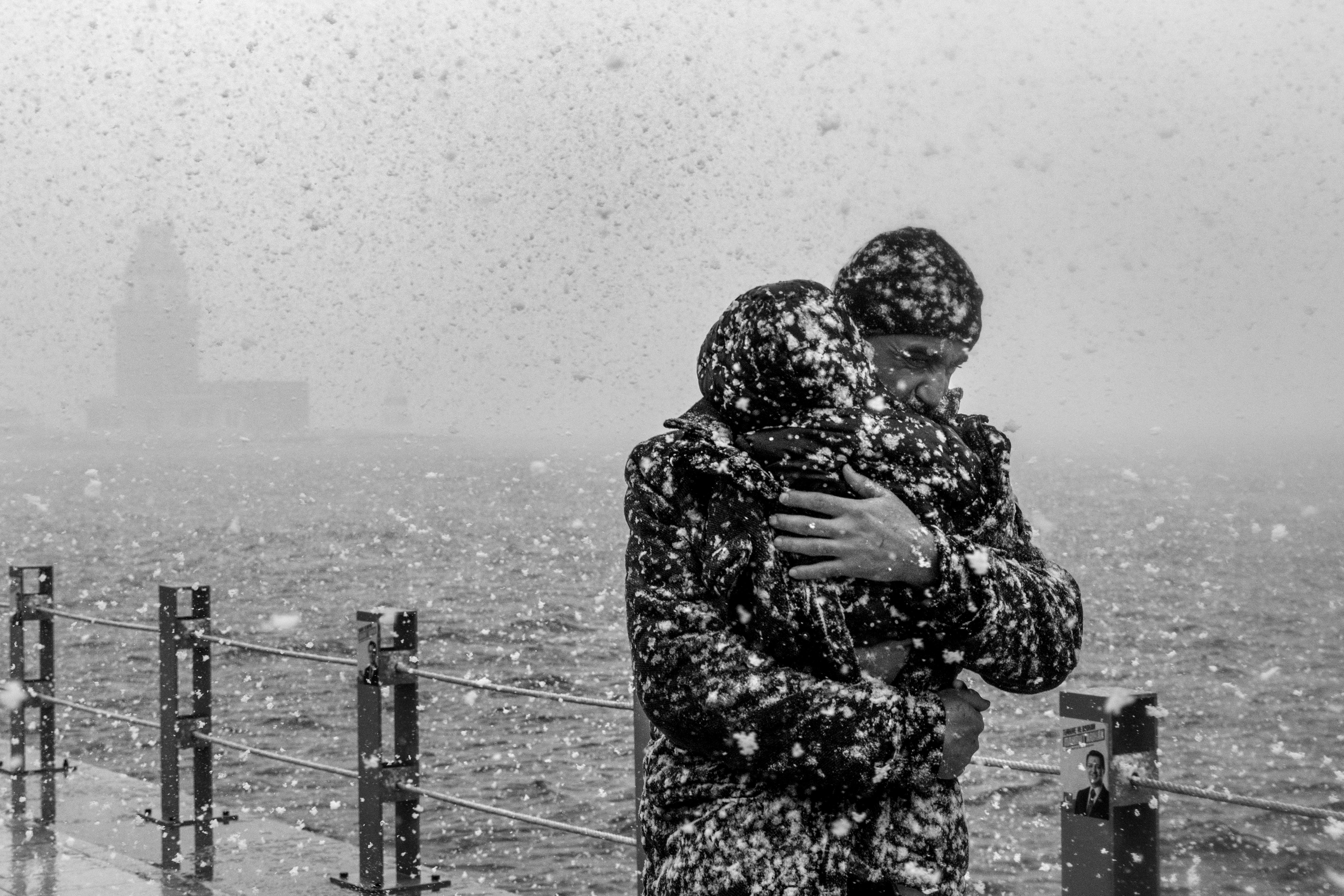 Hug In Snow Storm Photos, Download The BEST Free Hug In Snow Storm ...