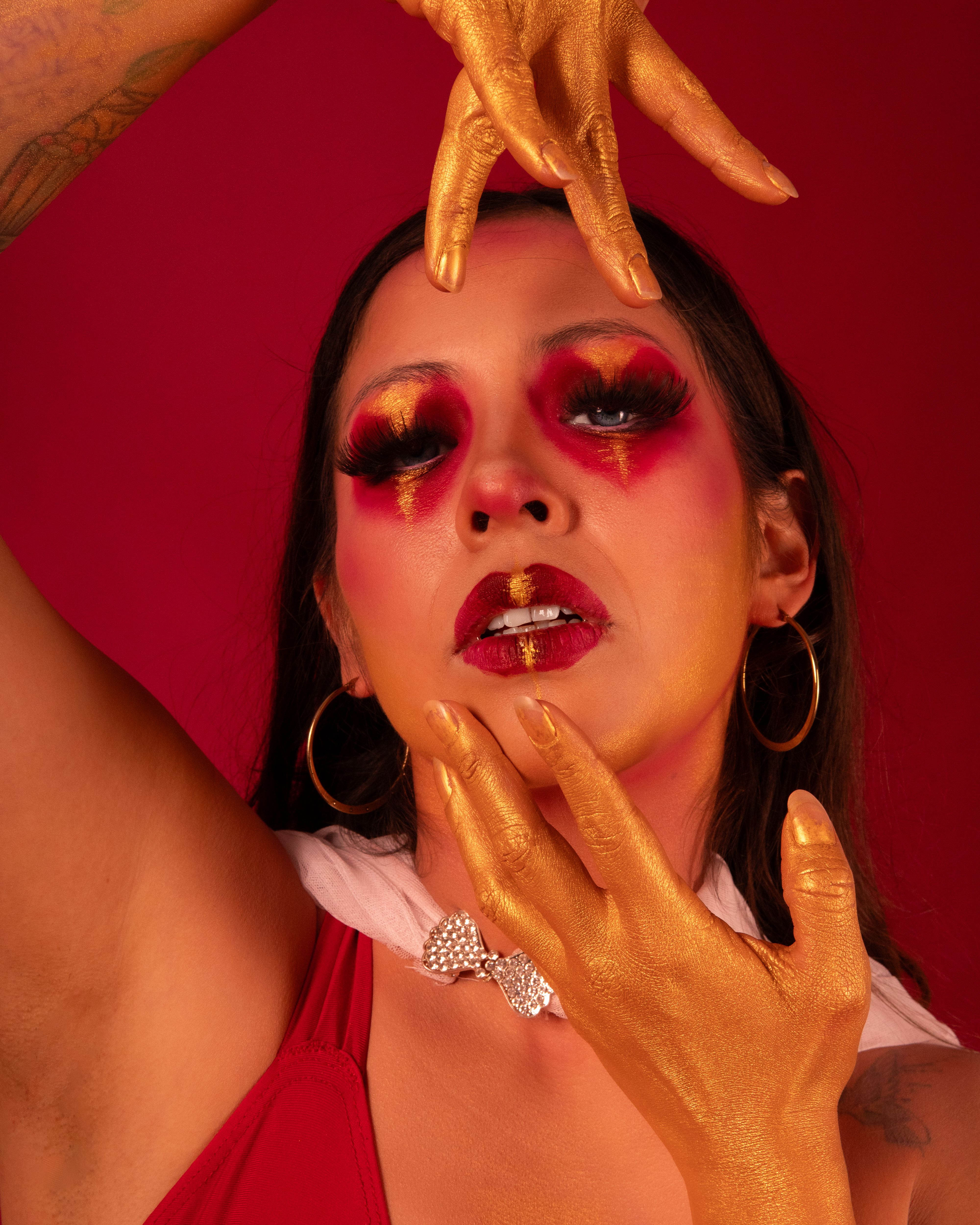 Dramatic Portrait of Woman with Gold Makeup · Free Stock Photo