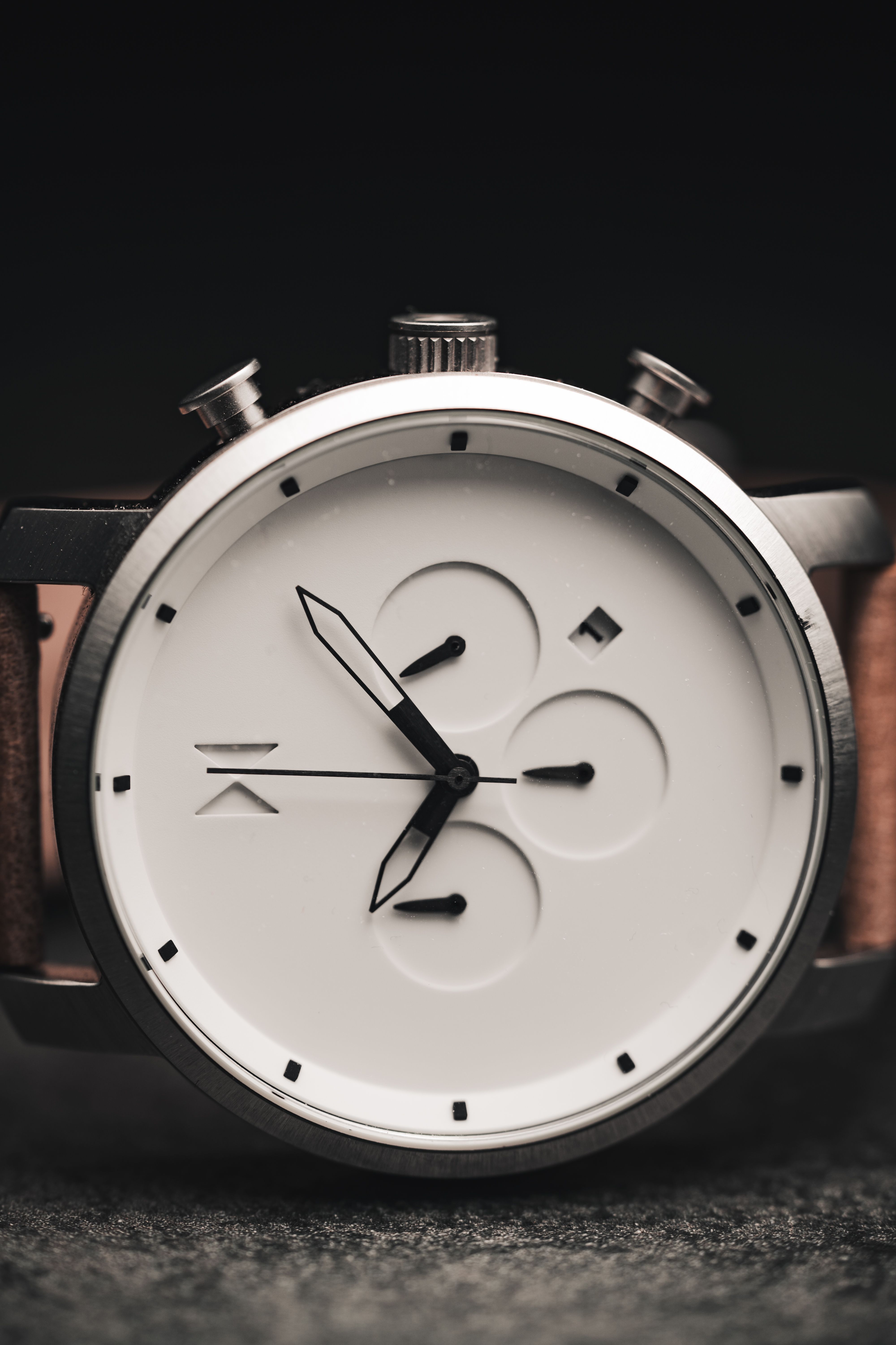 Minimalist Wristwatch with White Dial and Leather Strap · Free Stock Photo