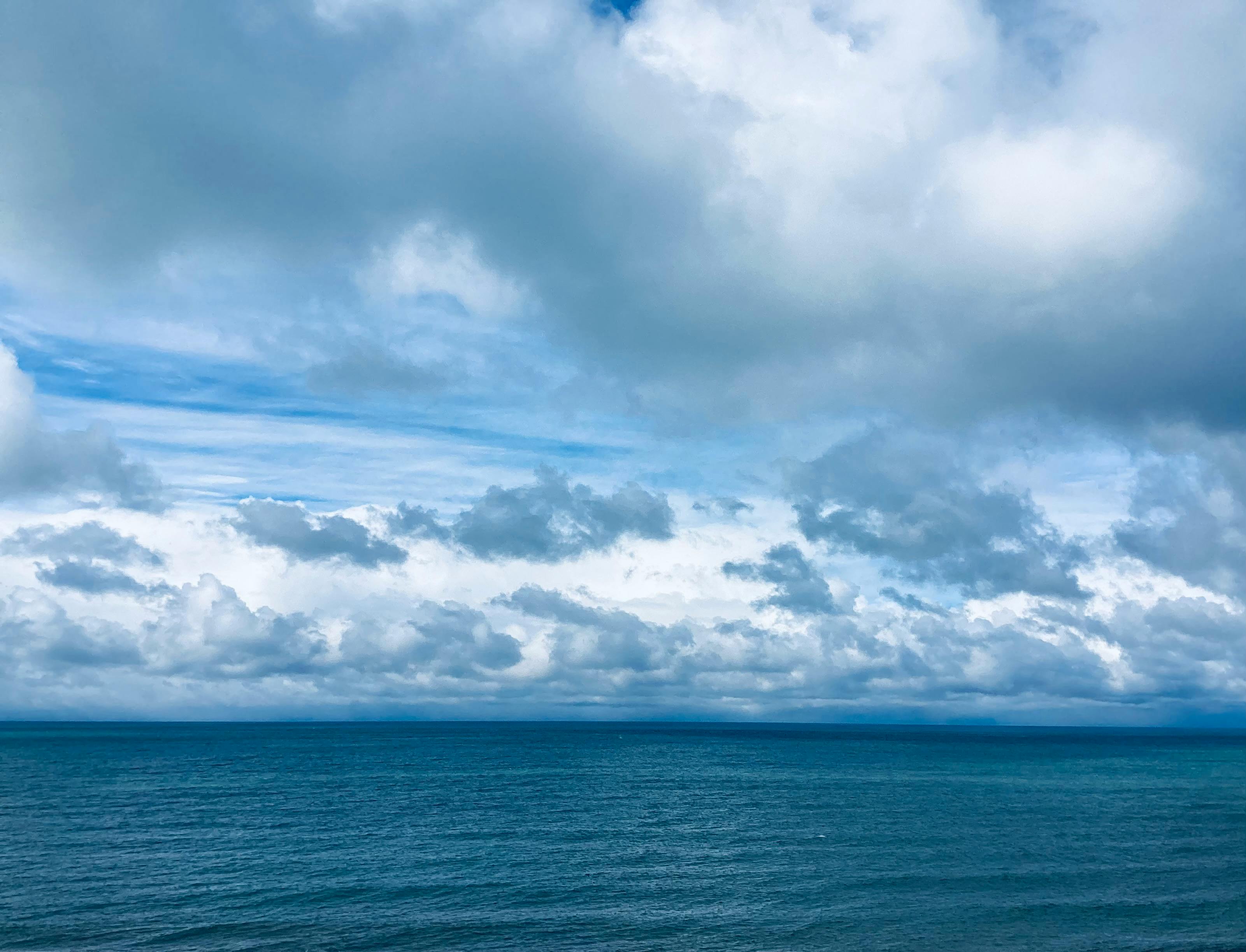 Dramatic Ocean View with Overcast Sky · Free Stock Photo