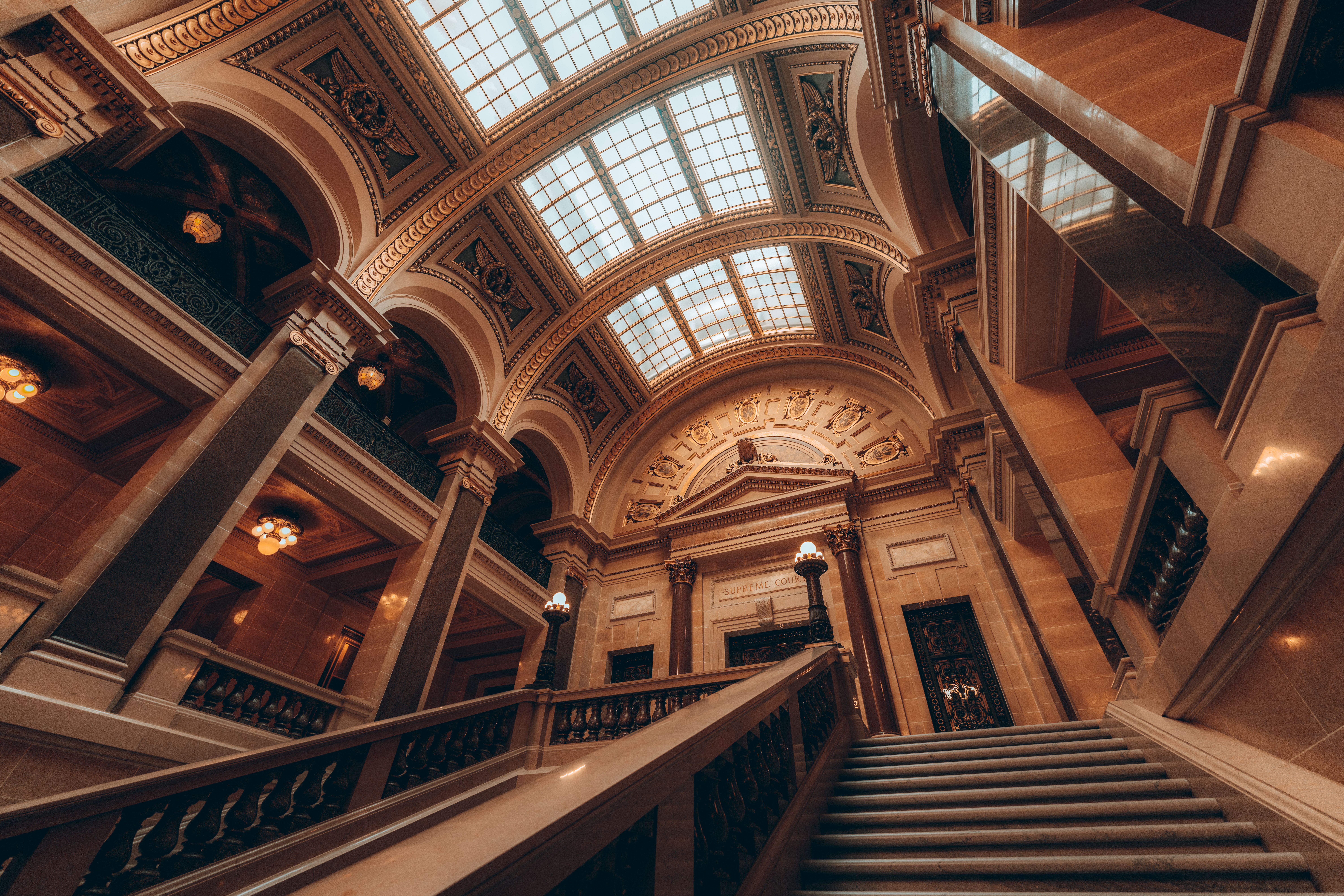 Grand Interior of Historic Building with Intricate Archways · Free ...