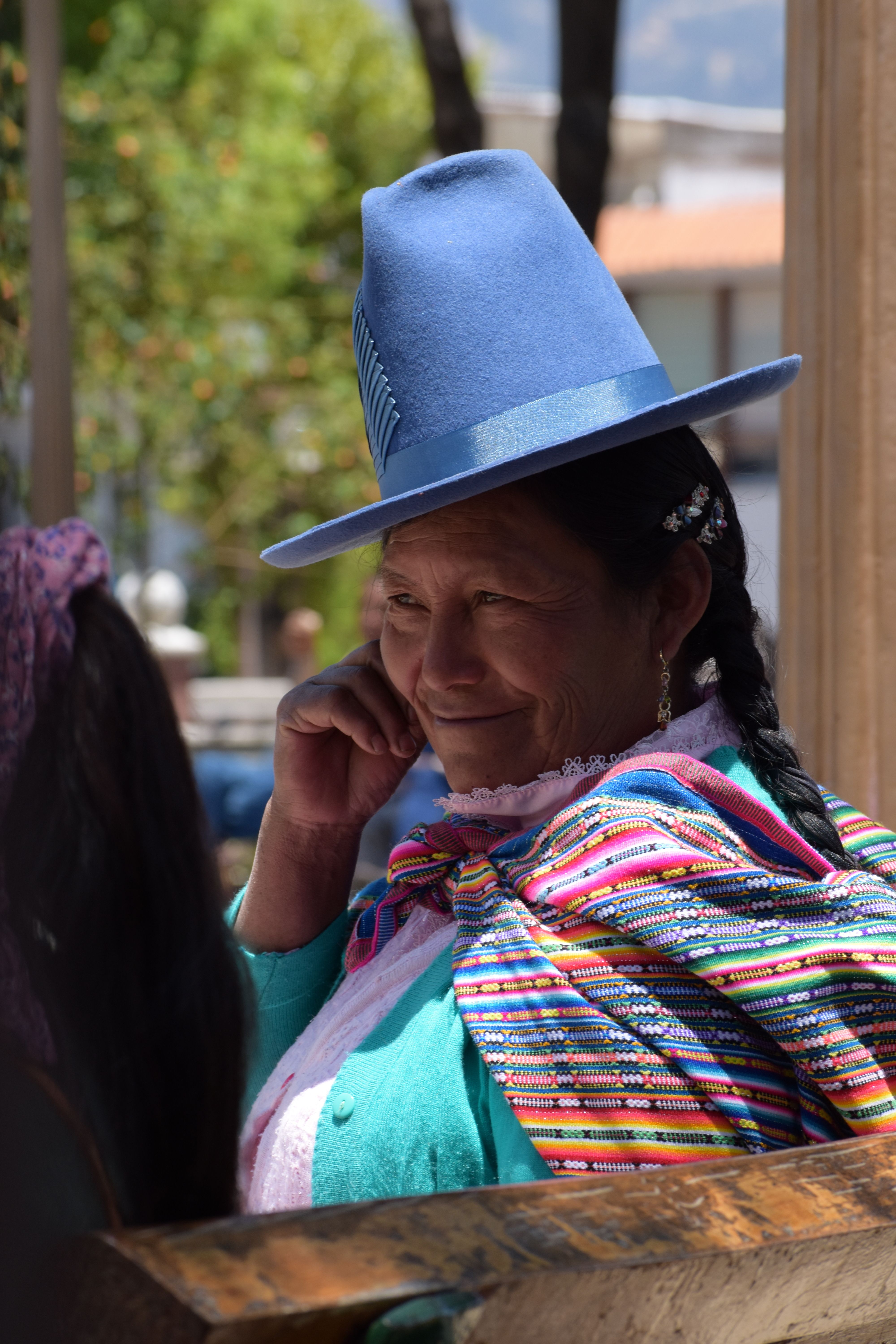 Portrait of a Woman in Traditional Peruvian Attire · Free Stock Photo