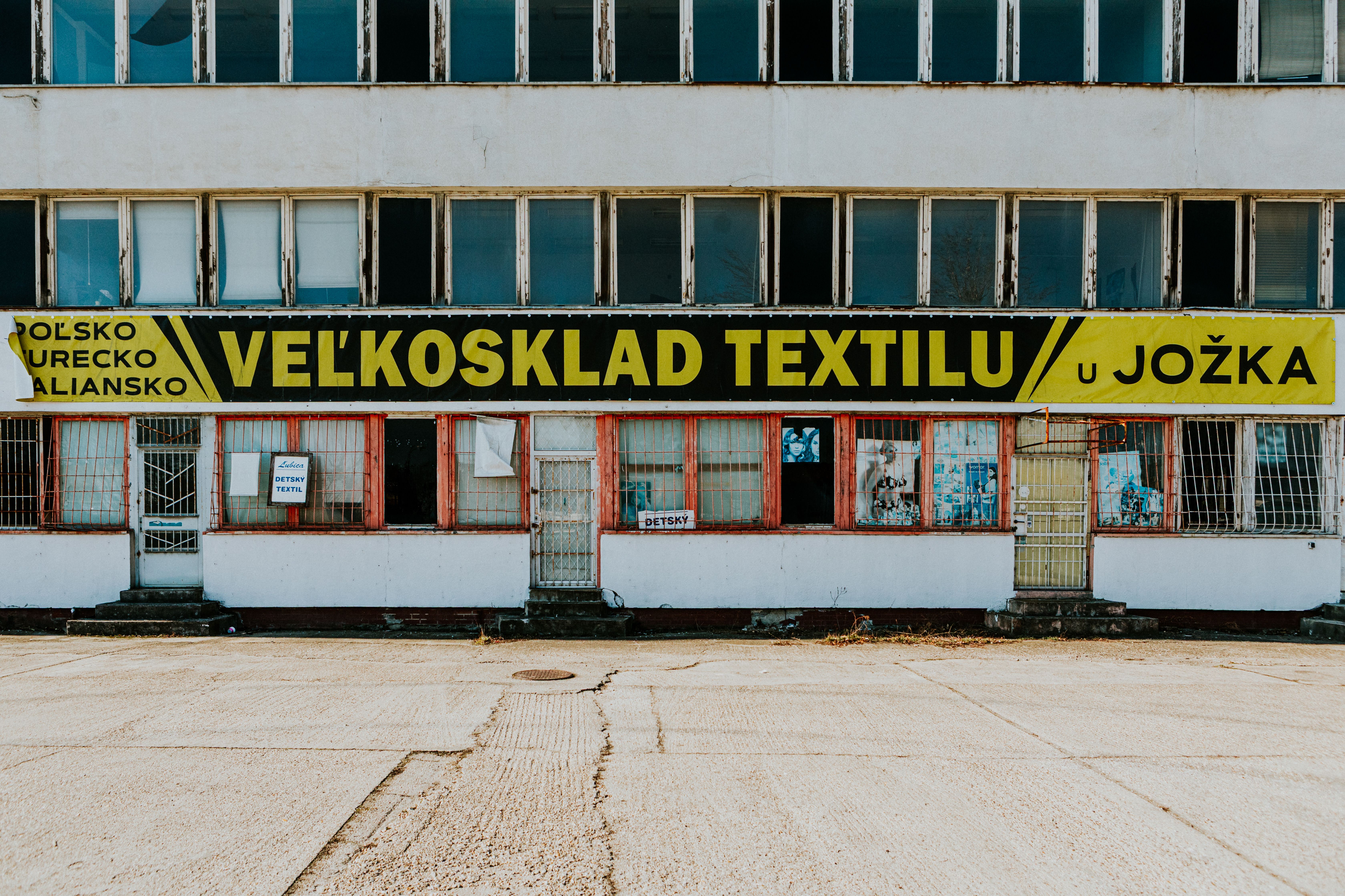 Textile Warehouse Building in Urban Setting · Free Stock Photo