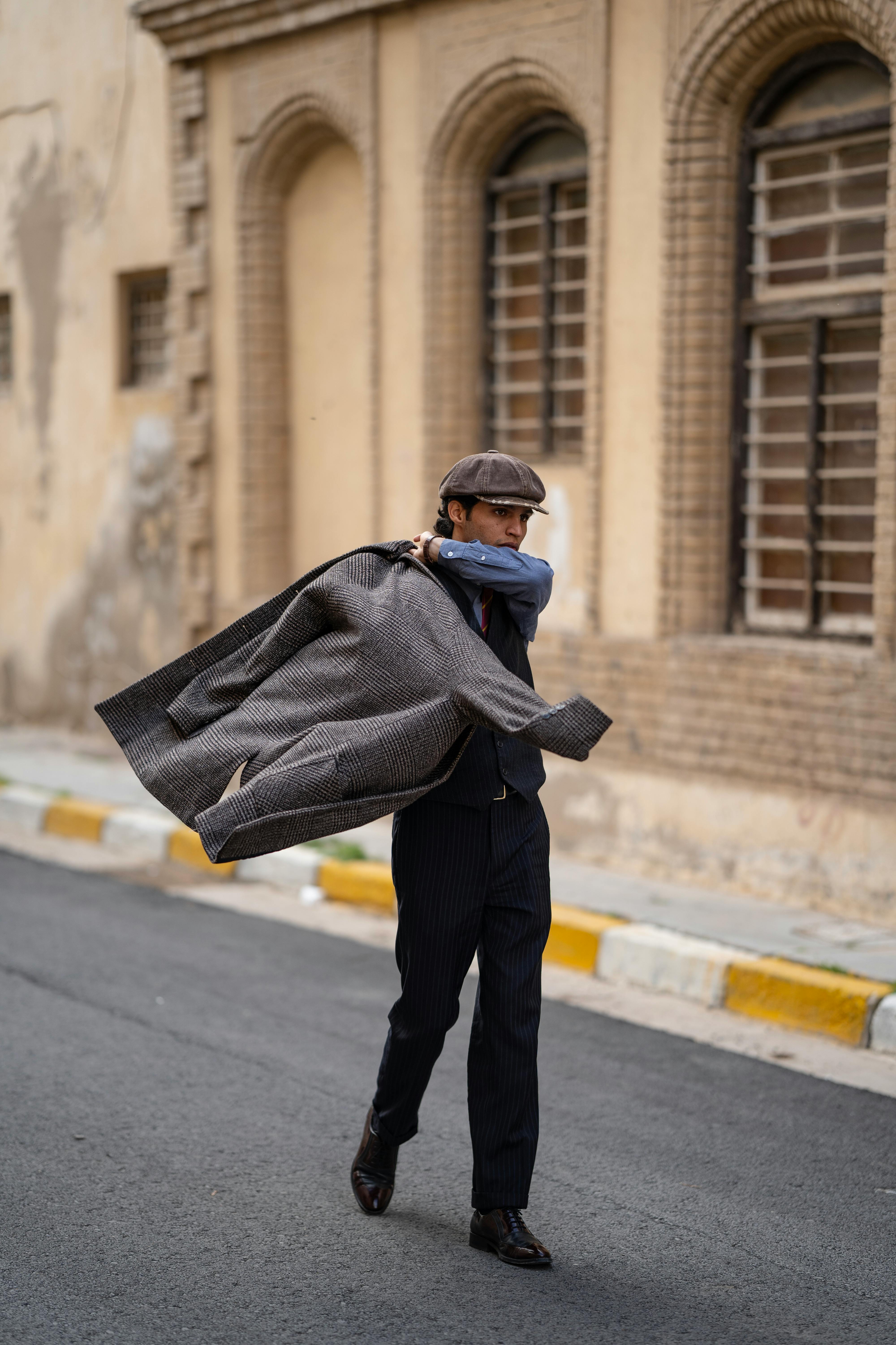 Elegant Man in Tweed Coat Walking Urban Street · Free Stock Photo