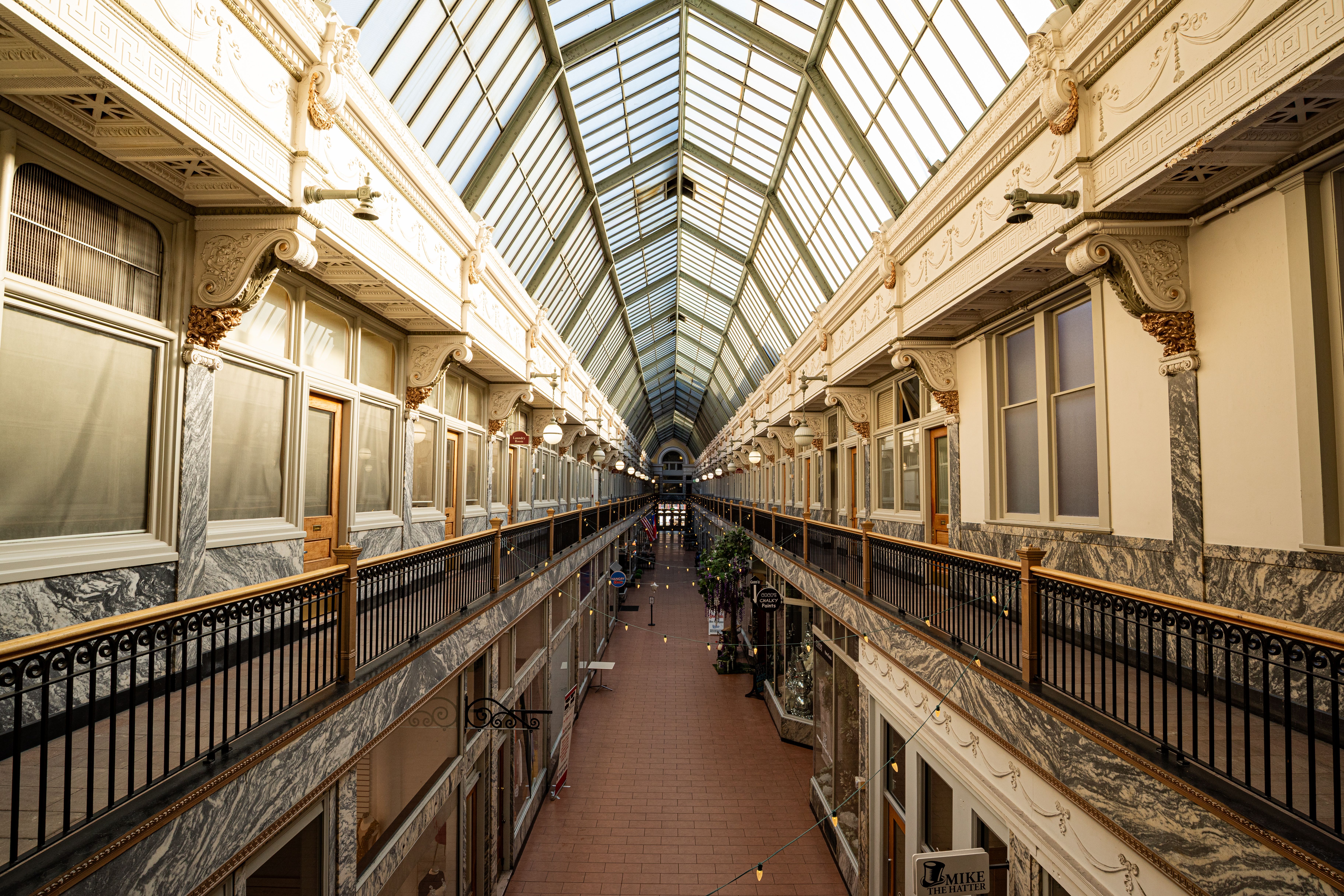 Elegant Shopping Arcade with Glass Roof · Free Stock Photo