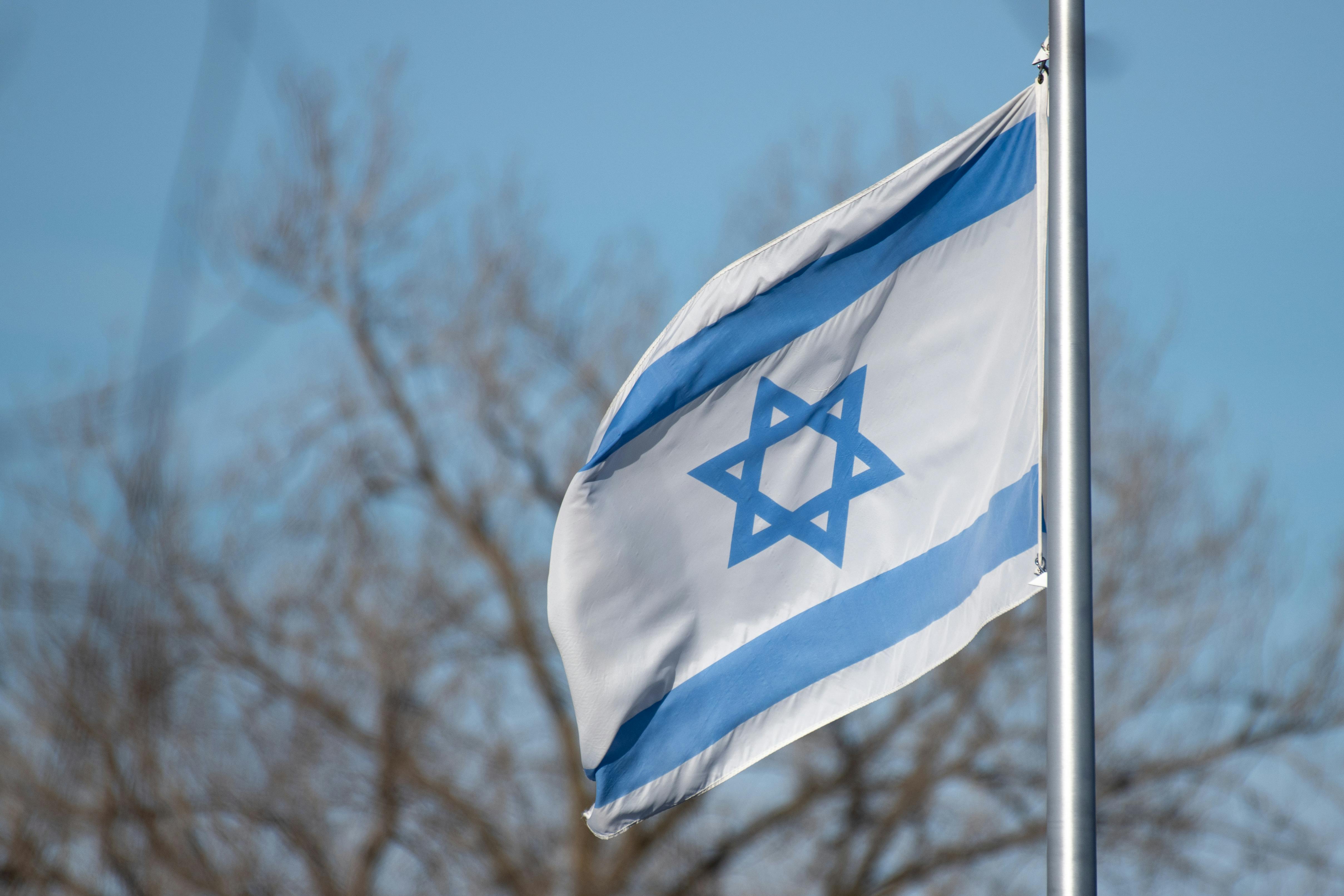 Flag of Israel with Star of David in Blue Sky · Free Stock Photo